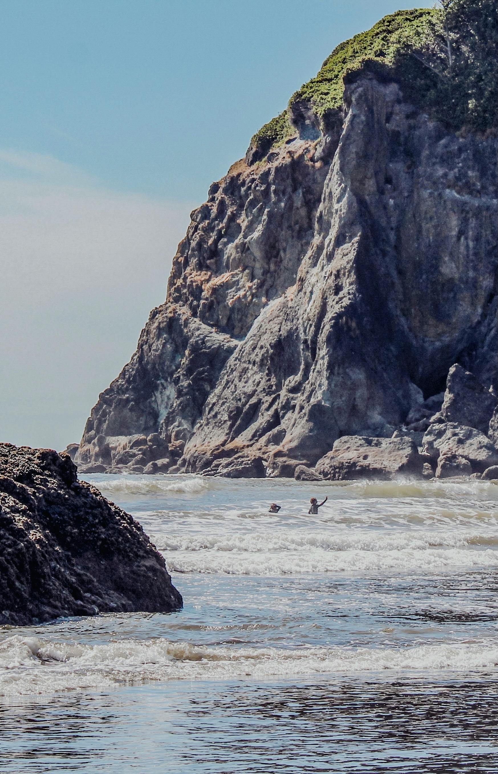 Landscape Photography of a Cliff at a Beach · Free Stock Photo