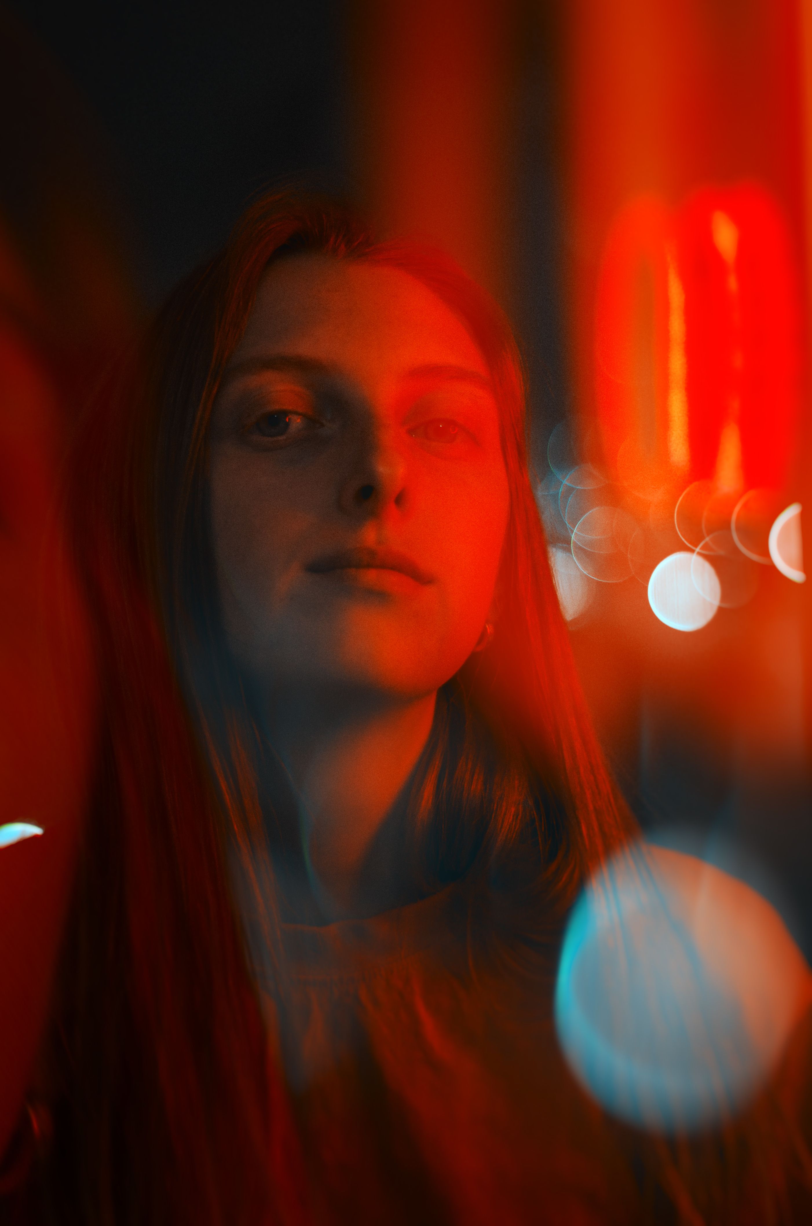 Shot of a Woman With Visible Lens Flare · Free Stock Photo