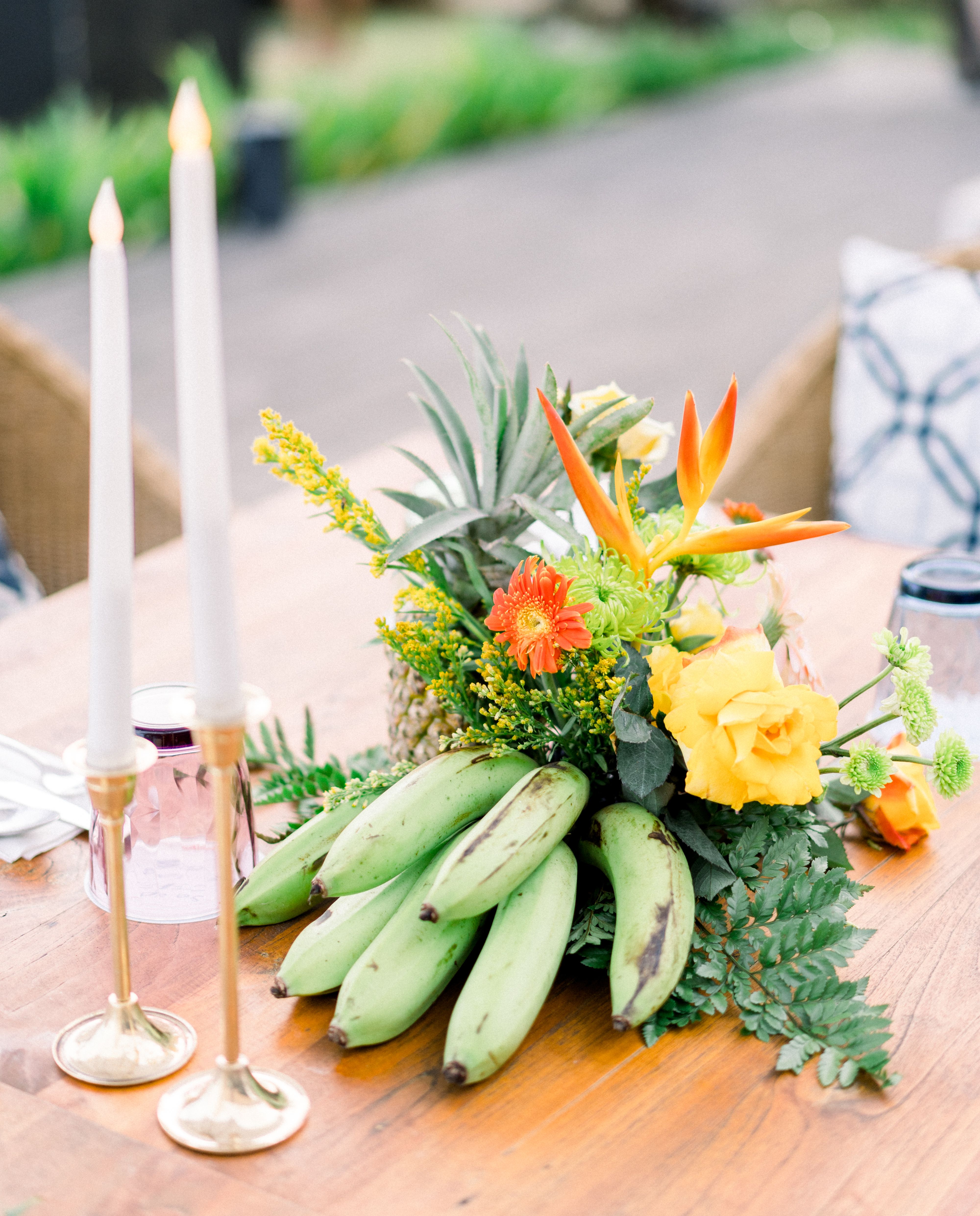 A Green Bananas Near the Bunch of Flowers on a Wooden Table · Free ...