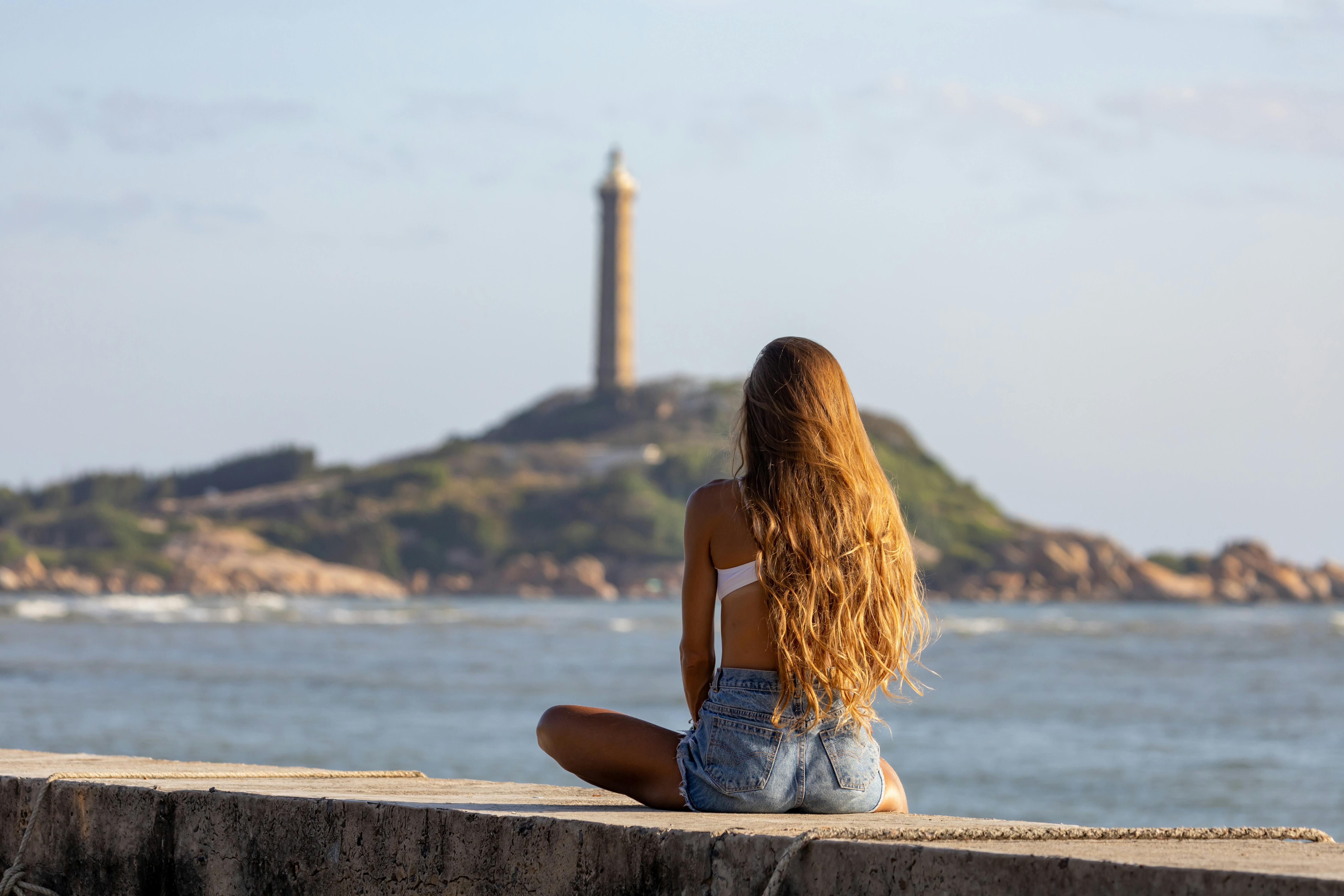 Back View of Woman in Hat Looking at the View · Free Stock Photo
