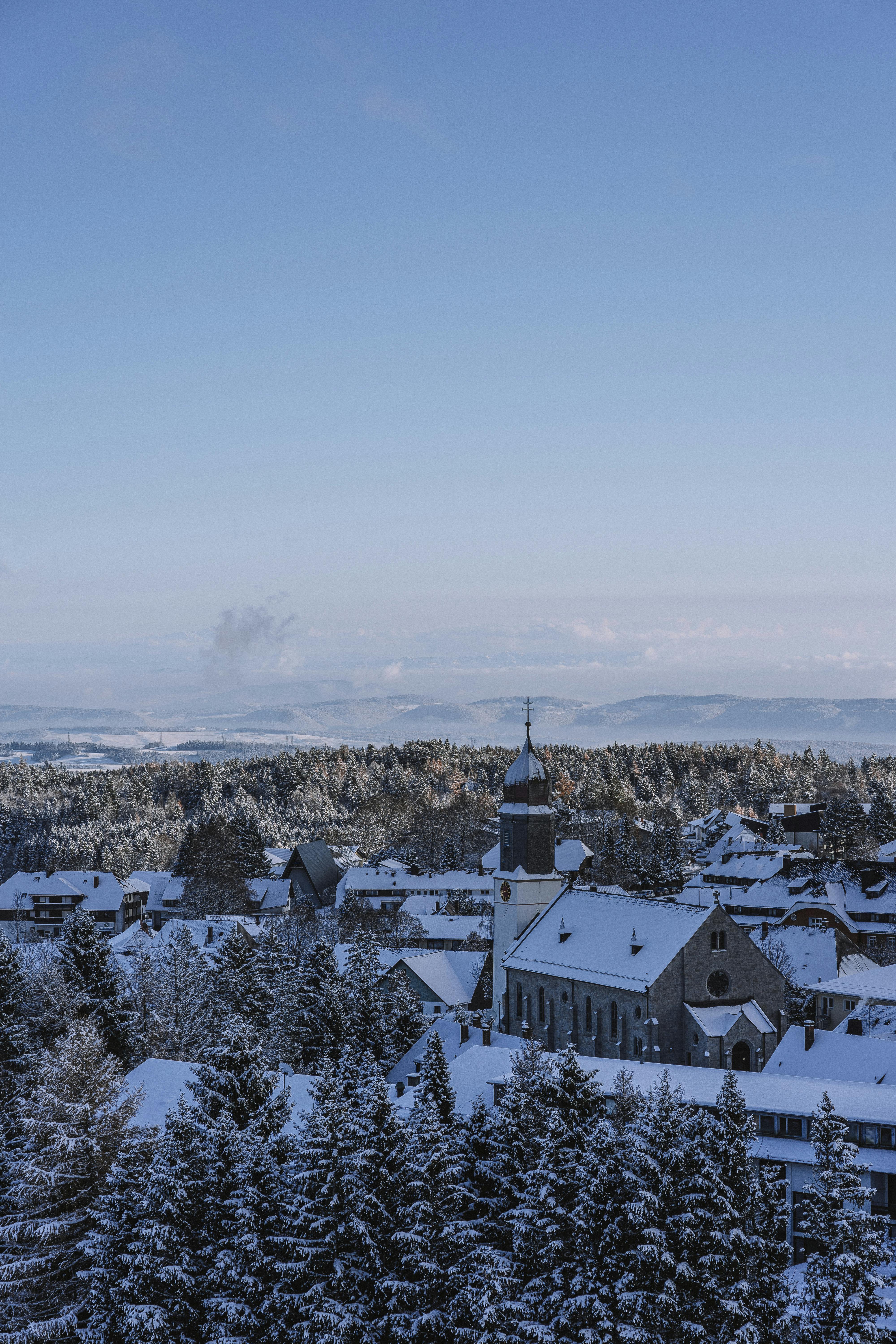 A Town Covered in Snow Under Blue Sky · Free Stock Photo