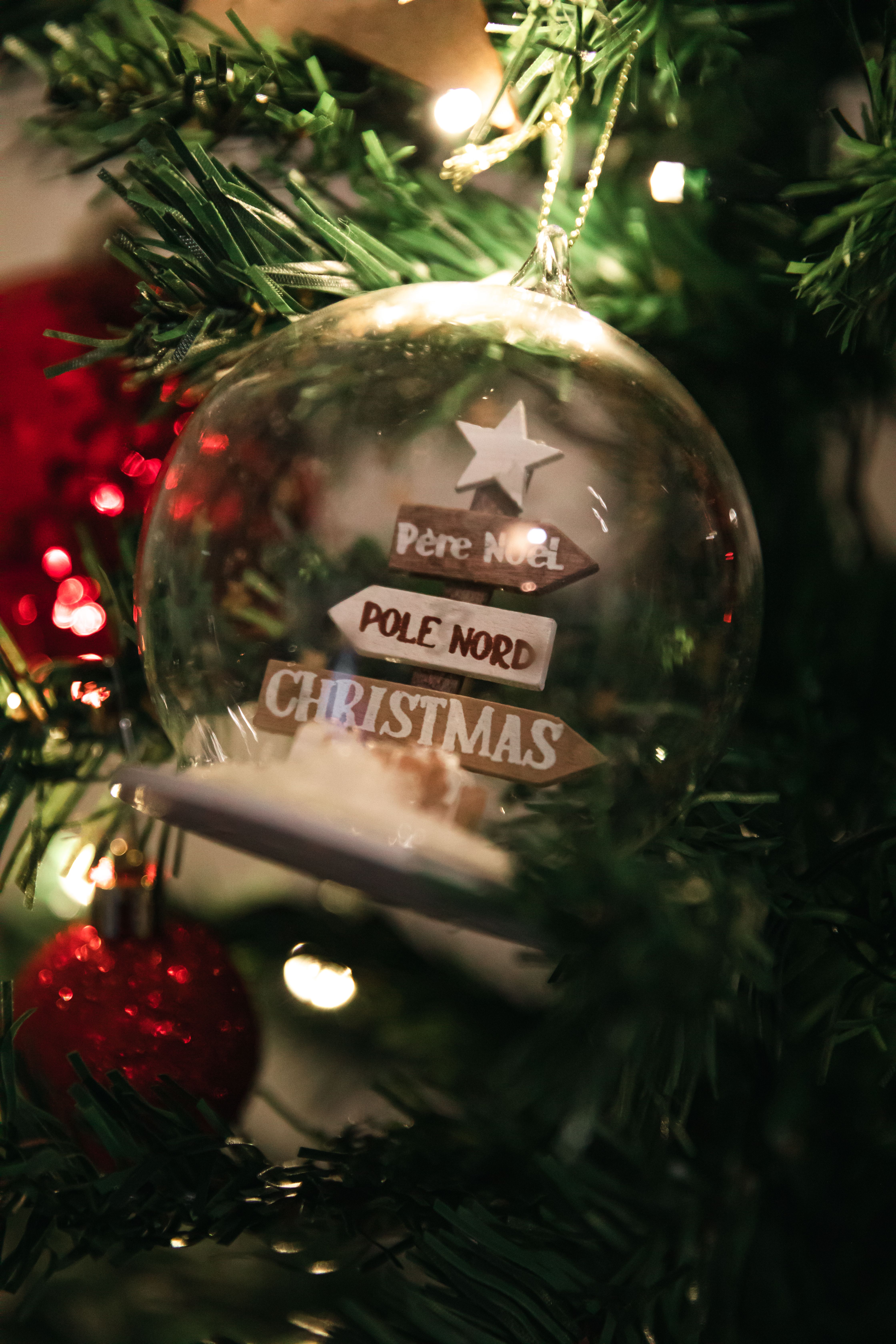 A Close-Up Shot of a Hanging Snow Globe · Free Stock Photo