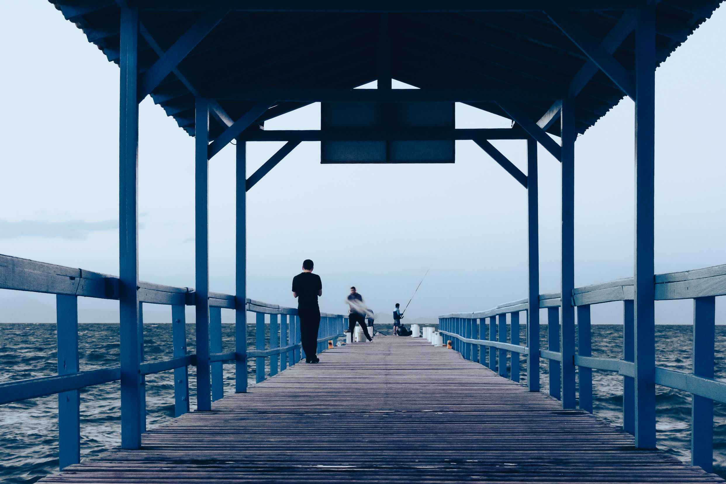 People fishing on a Wooden Jetty · Free Stock Photo