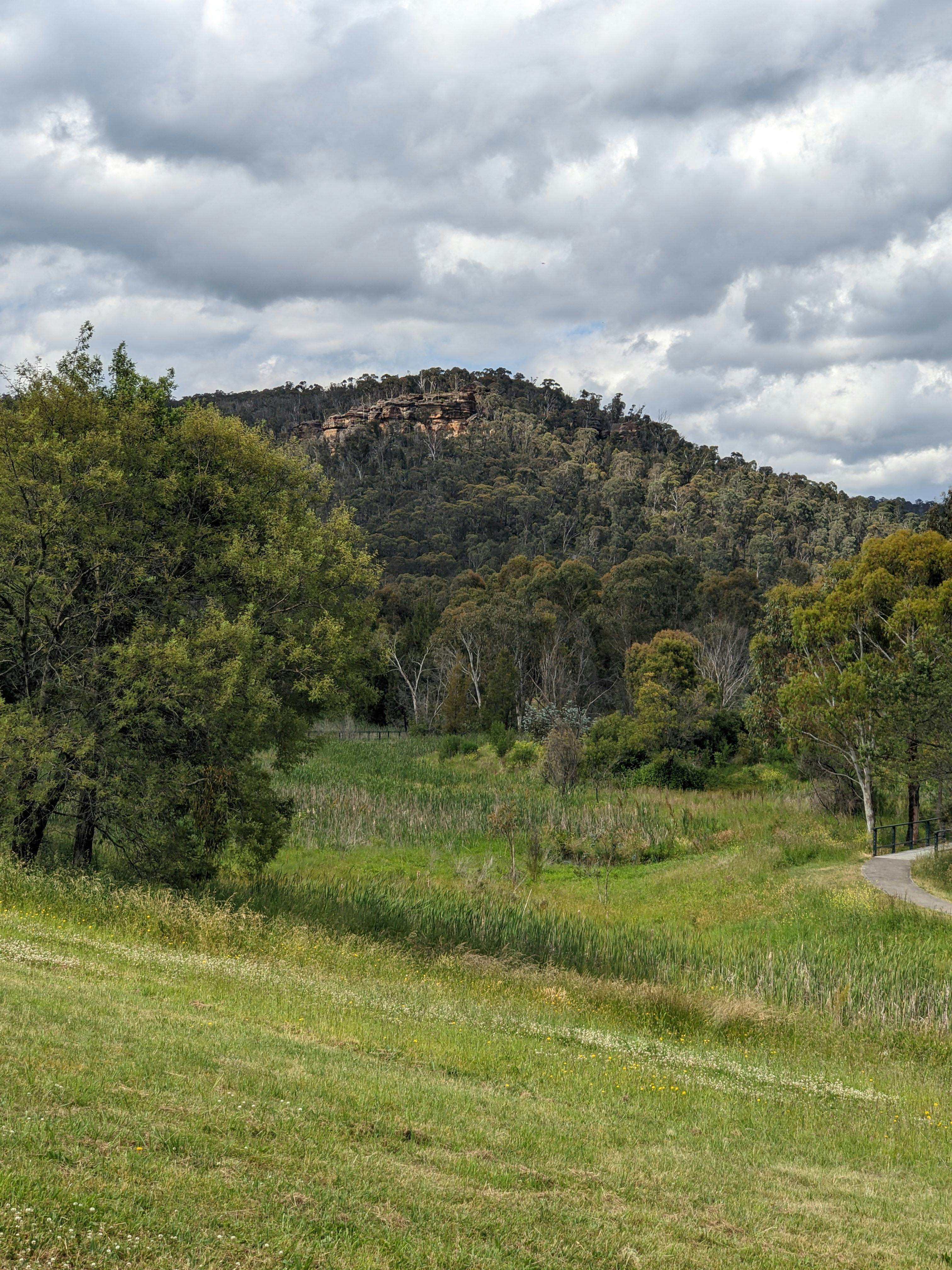 A House on a Hill between Trees in the Countryside · Free Stock Photo