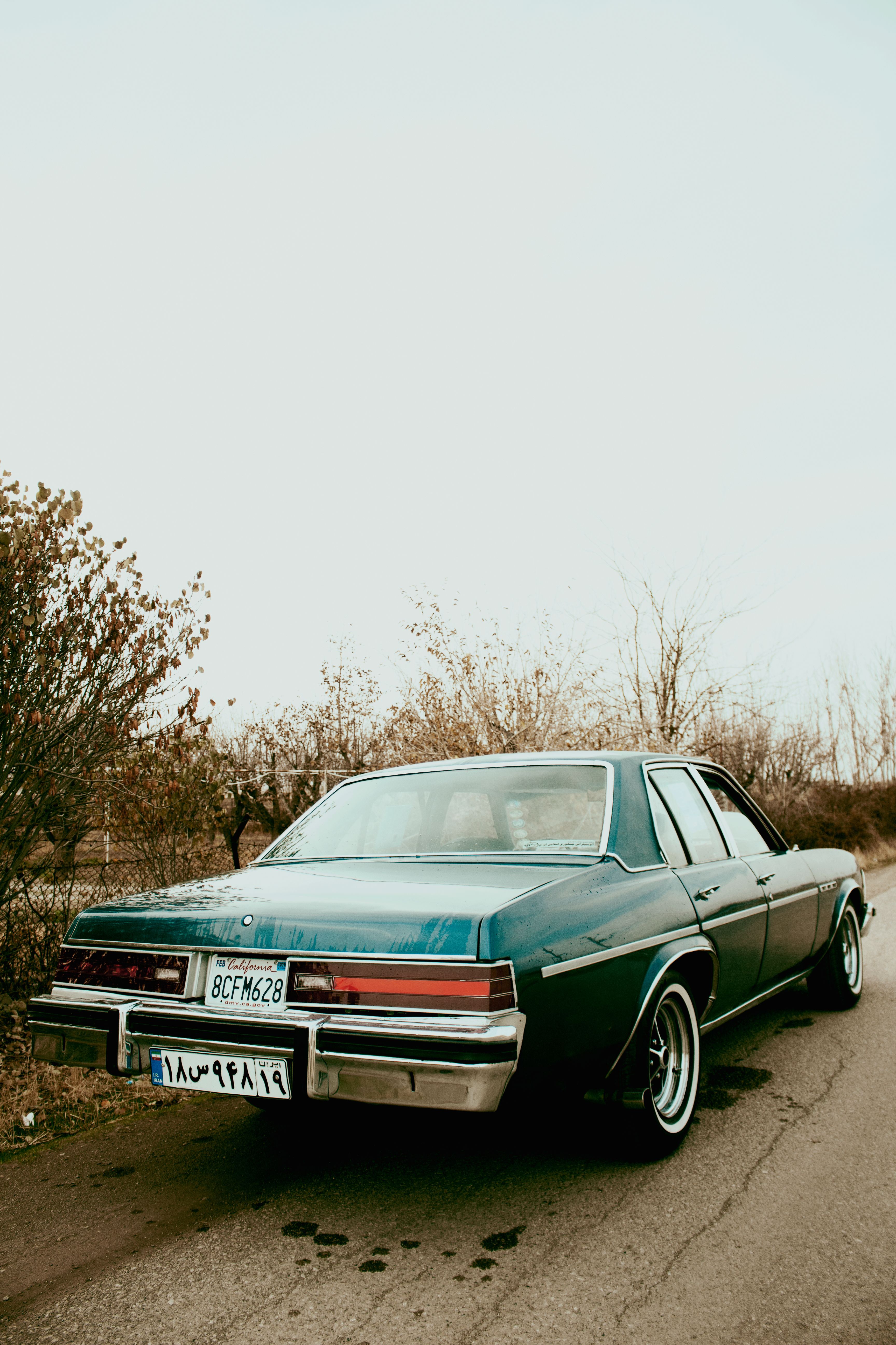 View of a Vintage Buick Parked on the Side of a Street · Free Stock Photo