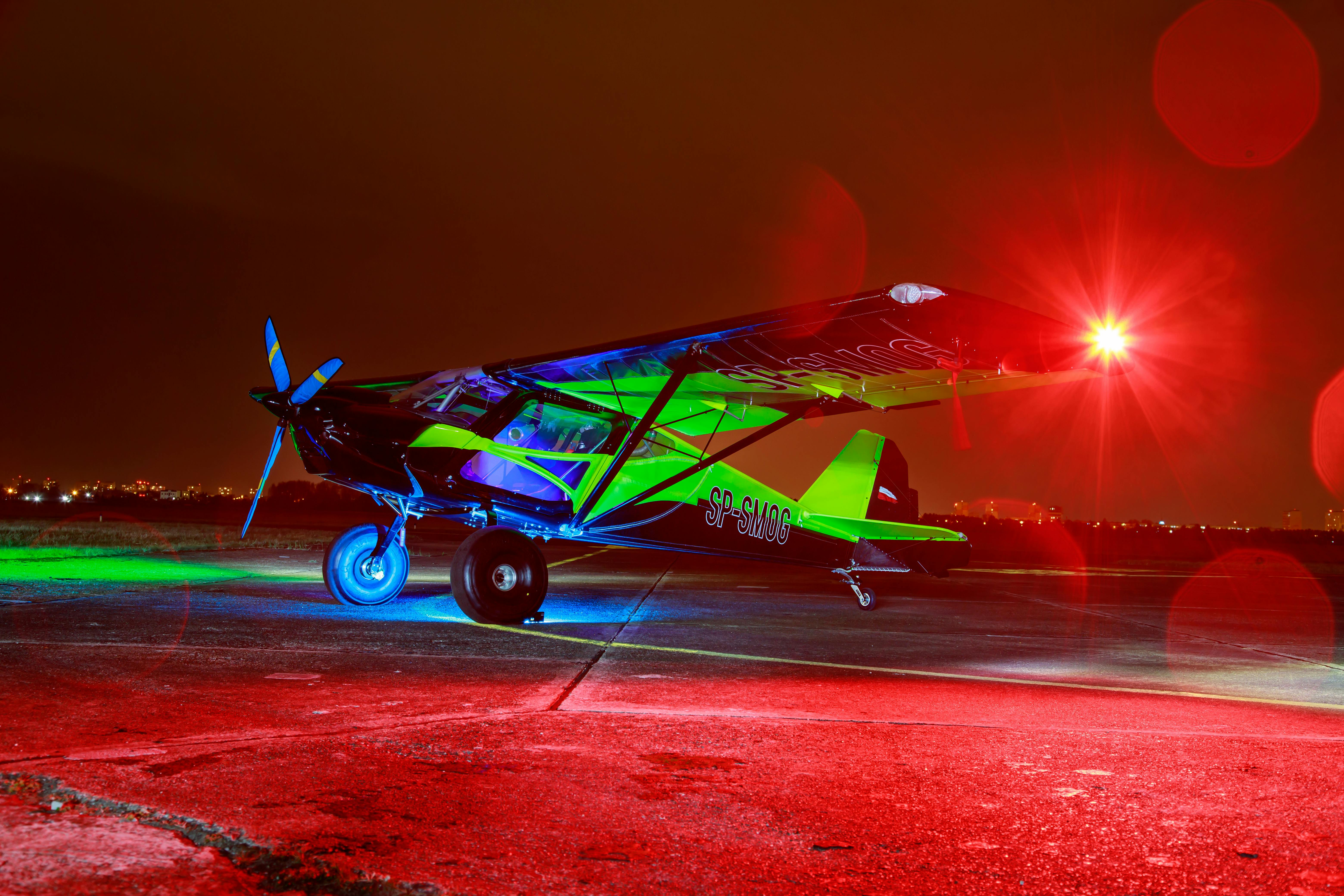 Illuminated Light Aircraft at Night · Free Stock Photo