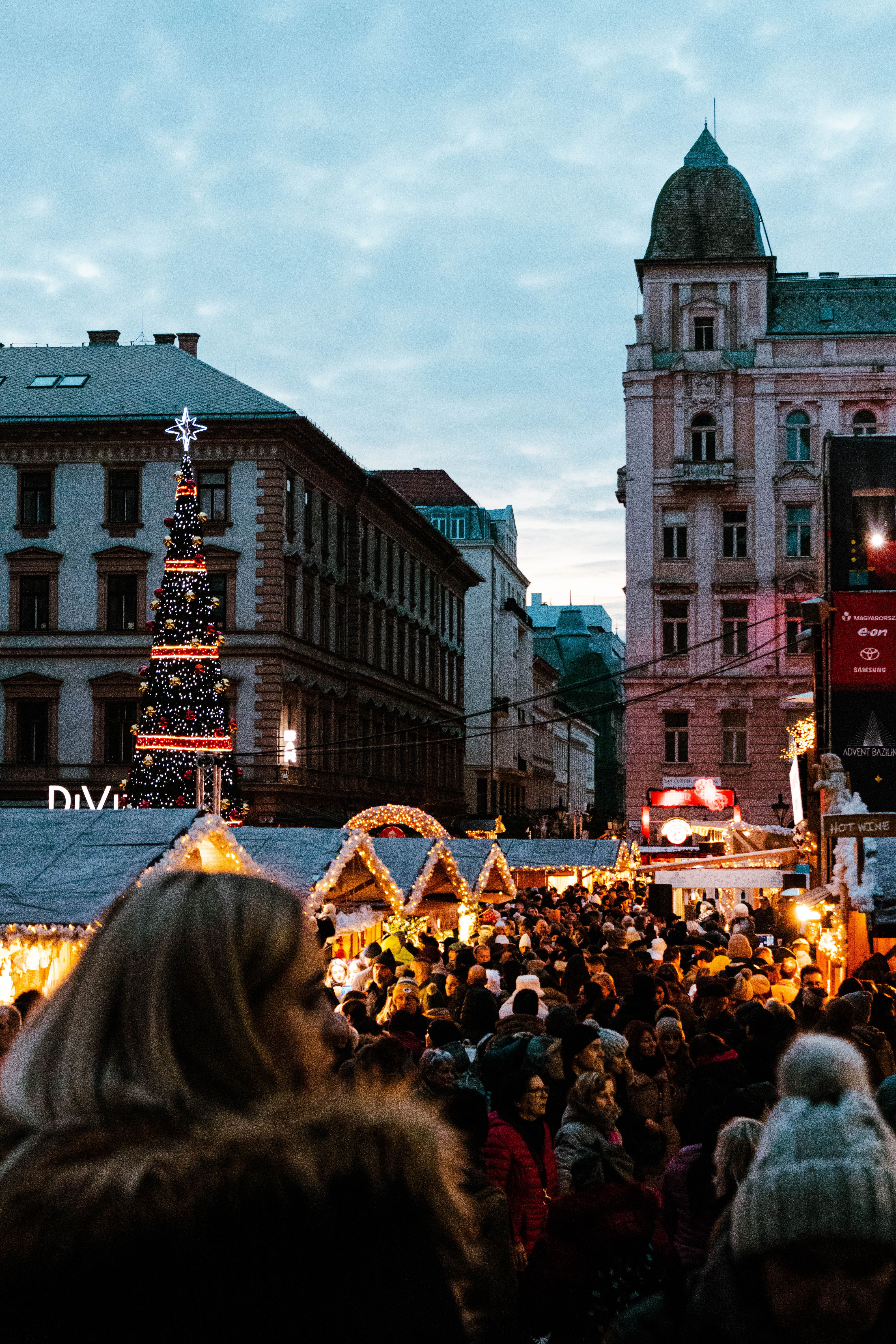 A Group of People Near Buildings · Free Stock Photo