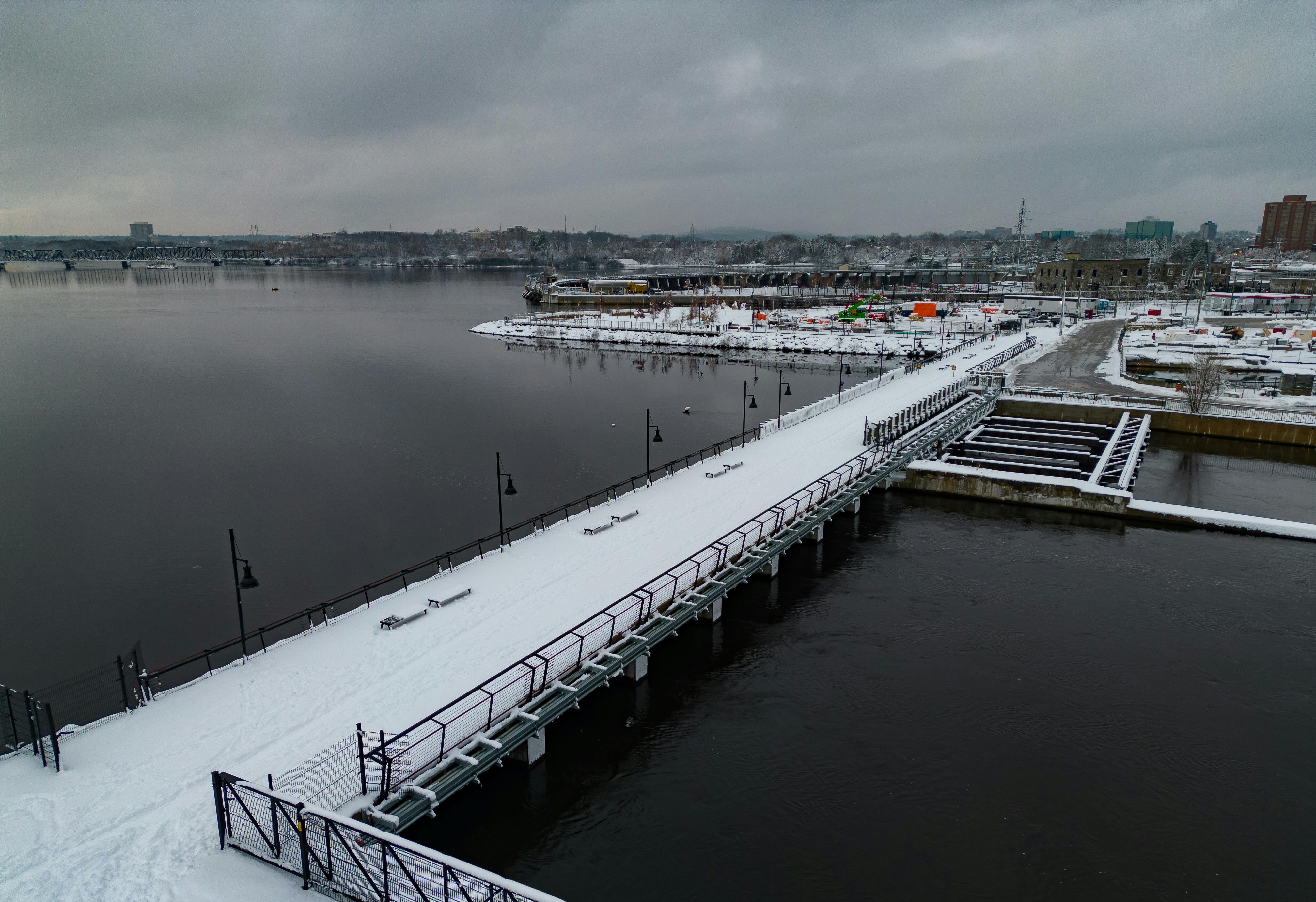 Aerial View of a Harbor and Pier Covered in Snow · Free Stock Photo