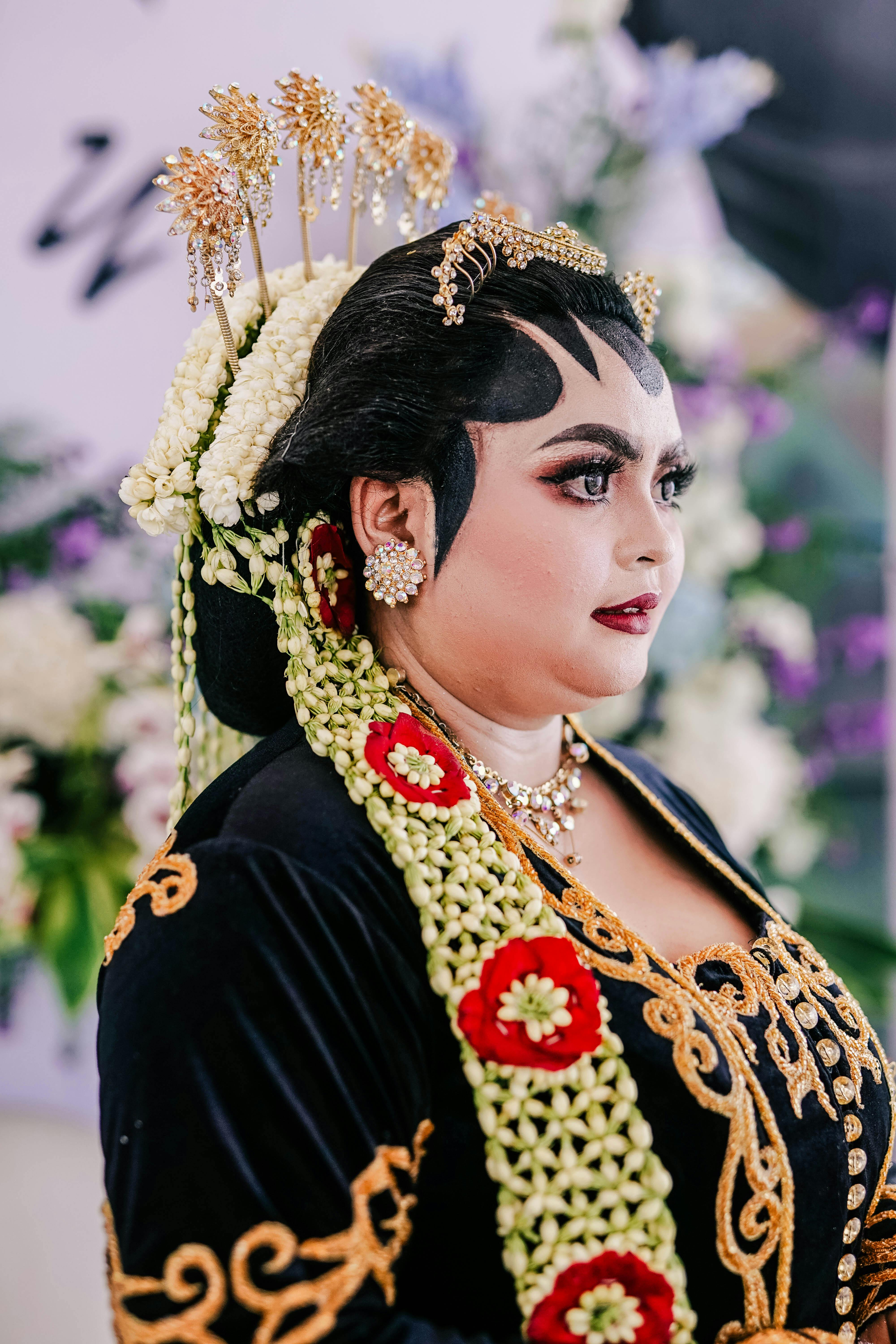 Woman in Traditional Embroidered Dress · Free Stock Photo