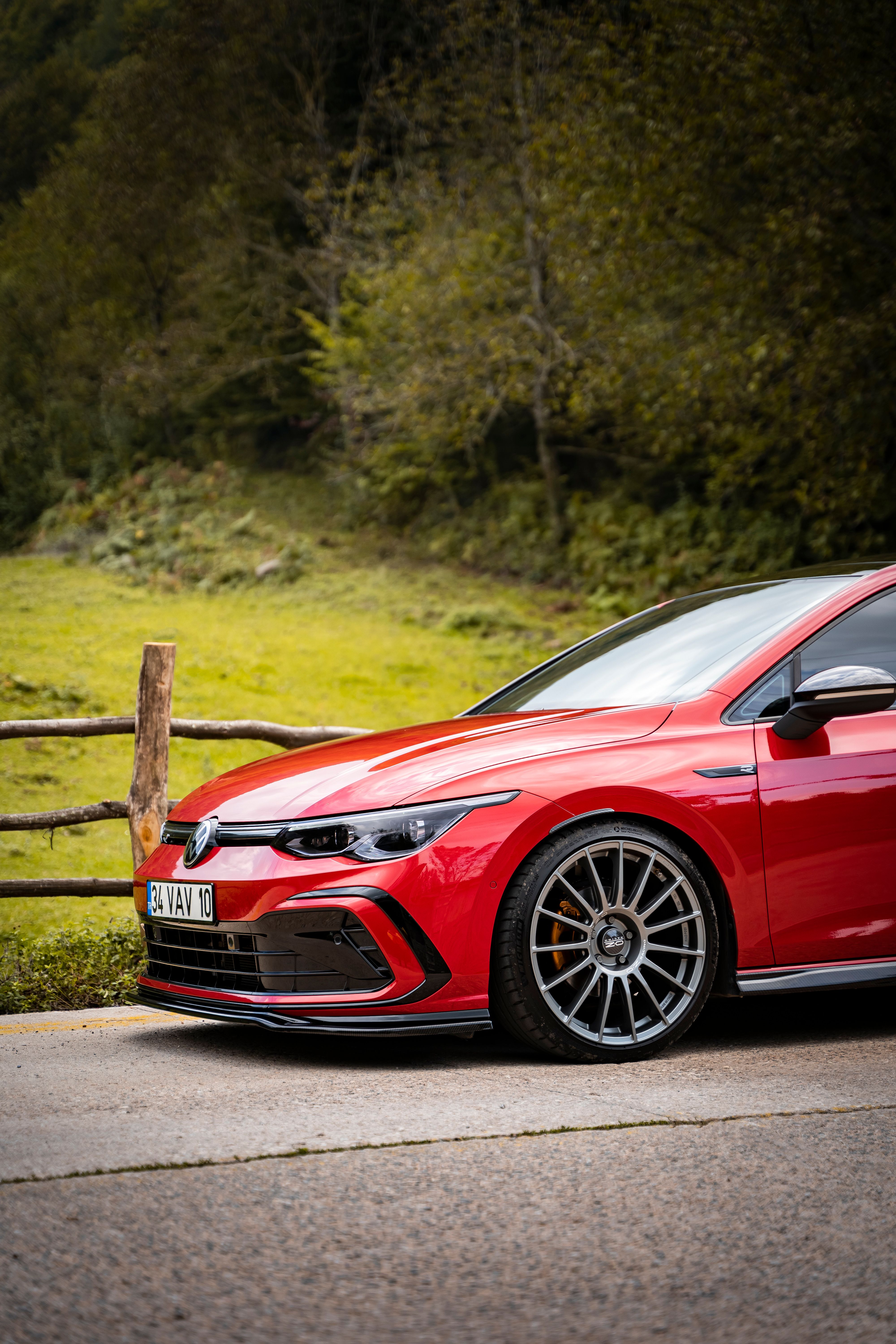 A Parked Red Volkswagen Golf GTI · Free Stock Photo