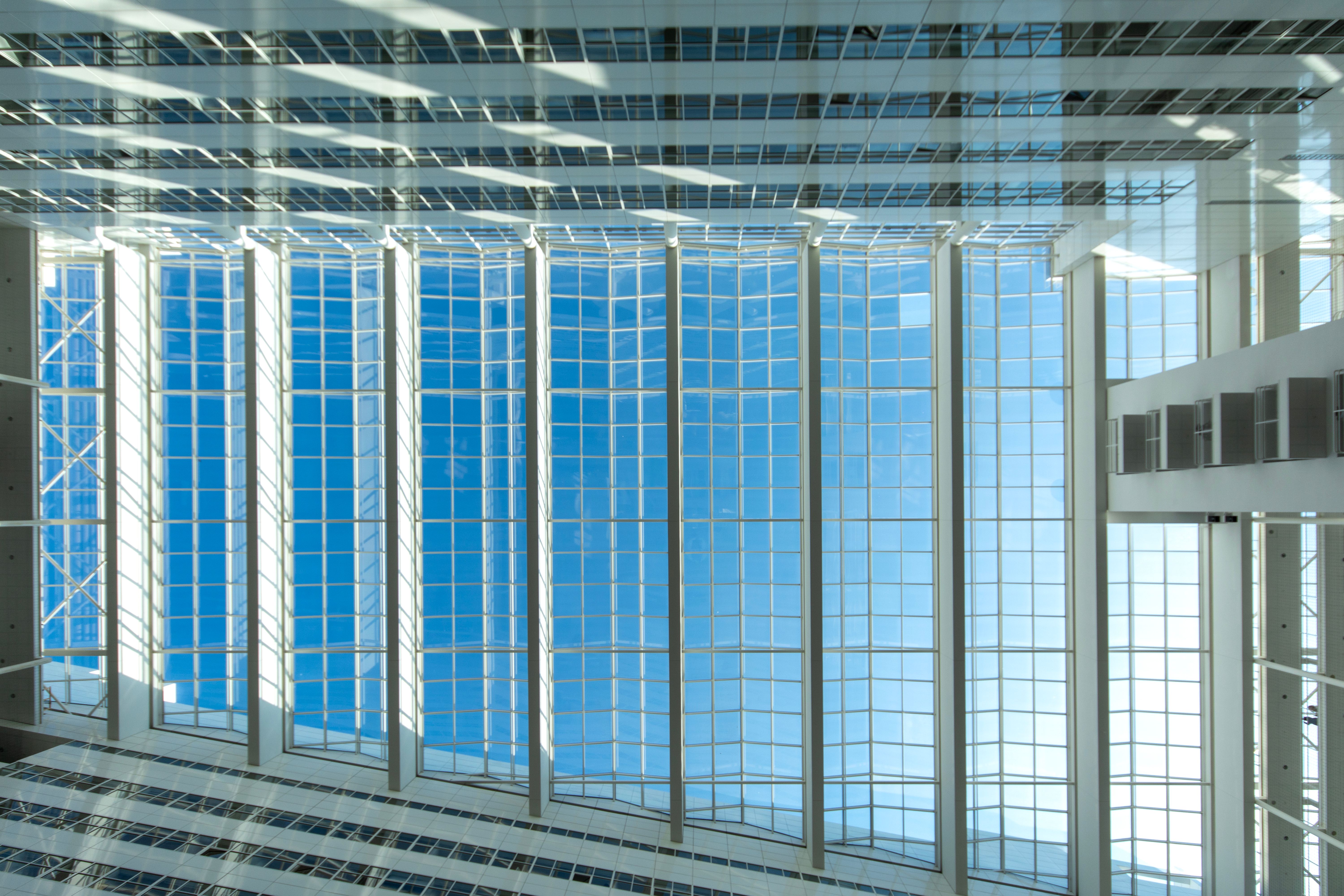 Clear Sky over Glass Ceiling · Free Stock Photo