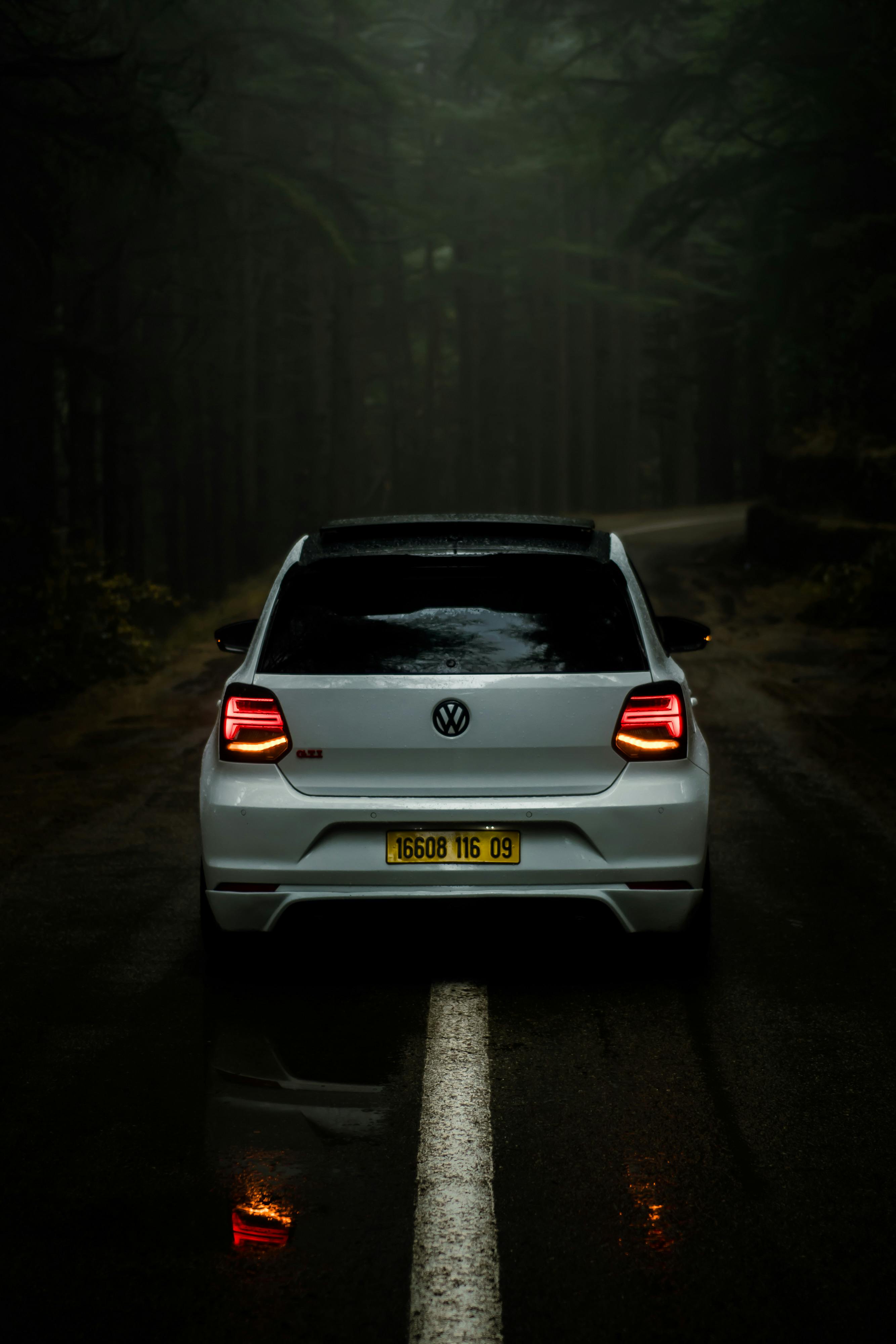 Photo of a White Car on Road · Free Stock Photo