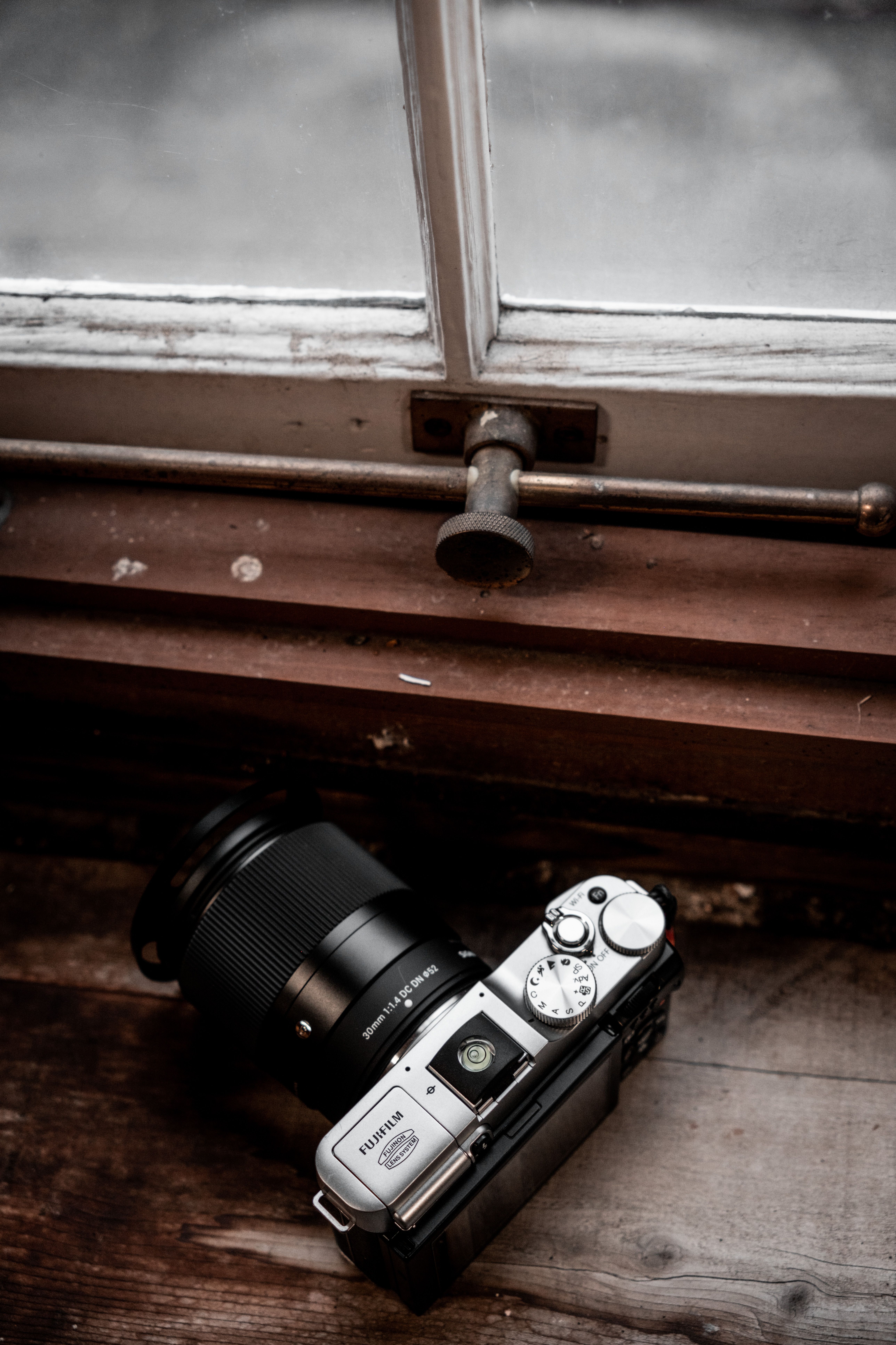 Camera at Old Window · Free Stock Photo