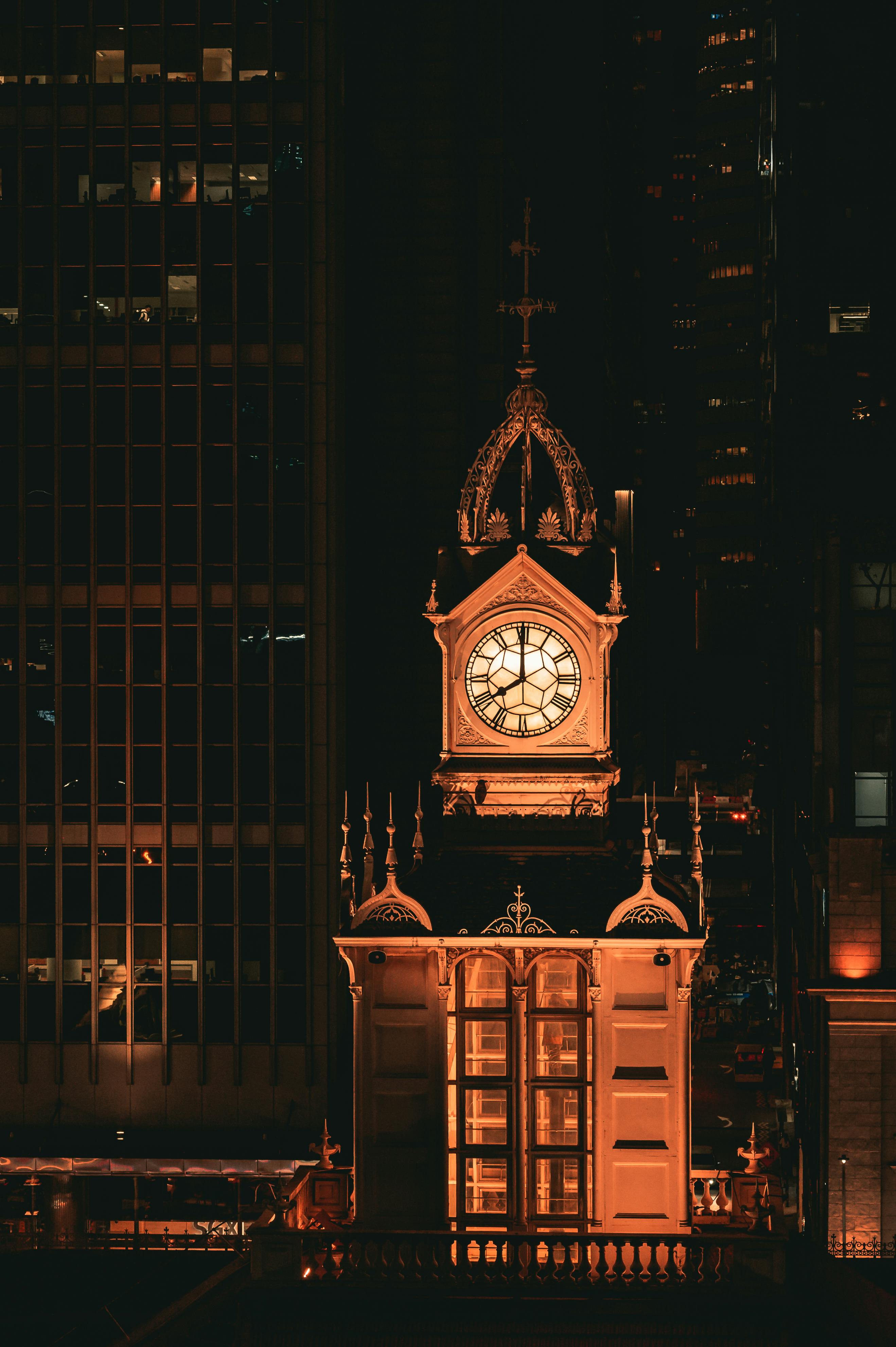 Clock Tower in a City at Night · Free Stock Photo