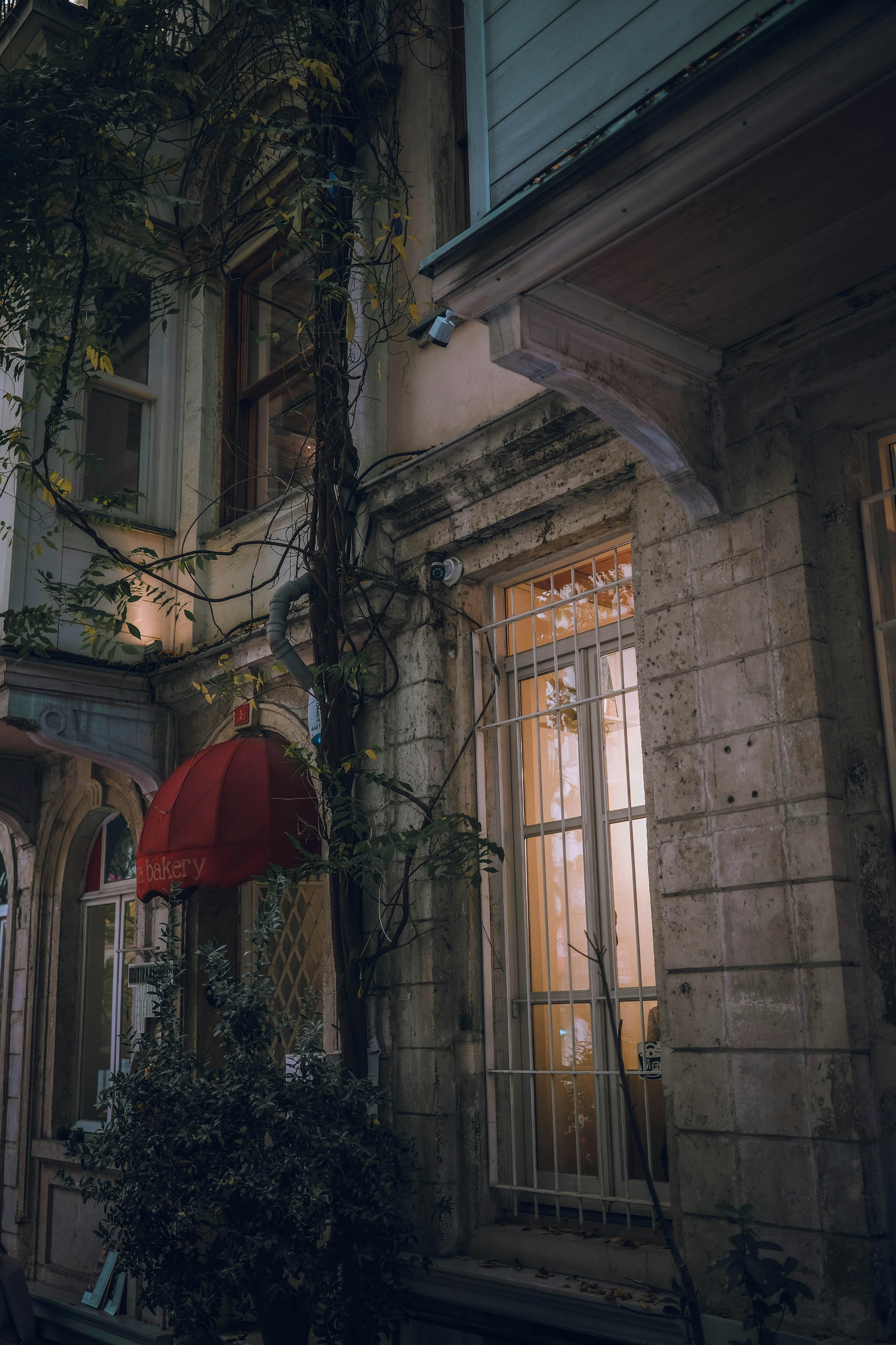 A Glass Window with Metal Railing · Free Stock Photo
