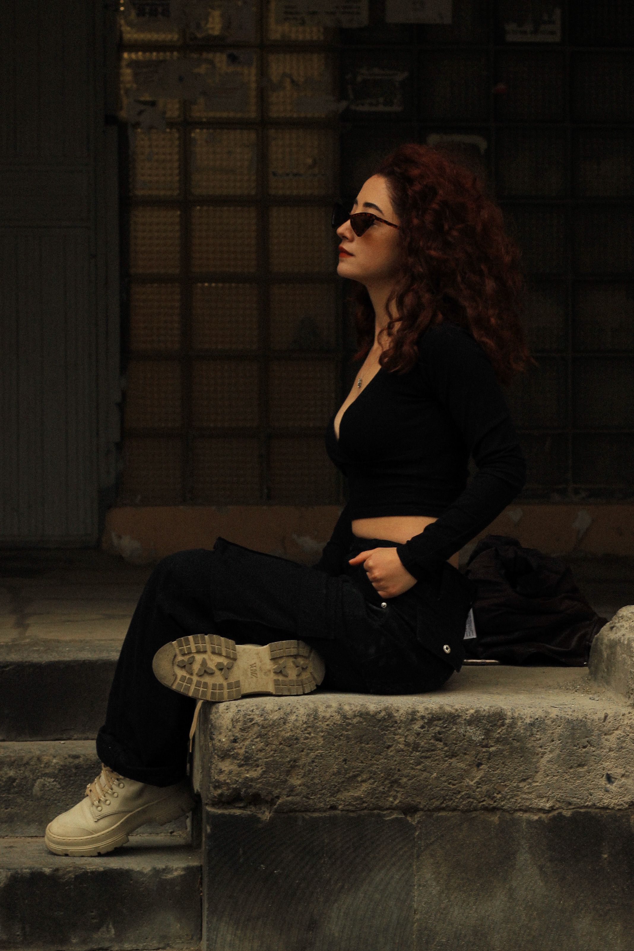 A Side View of a Woman Kneeling on a Wooden Floor while Looking Up ...