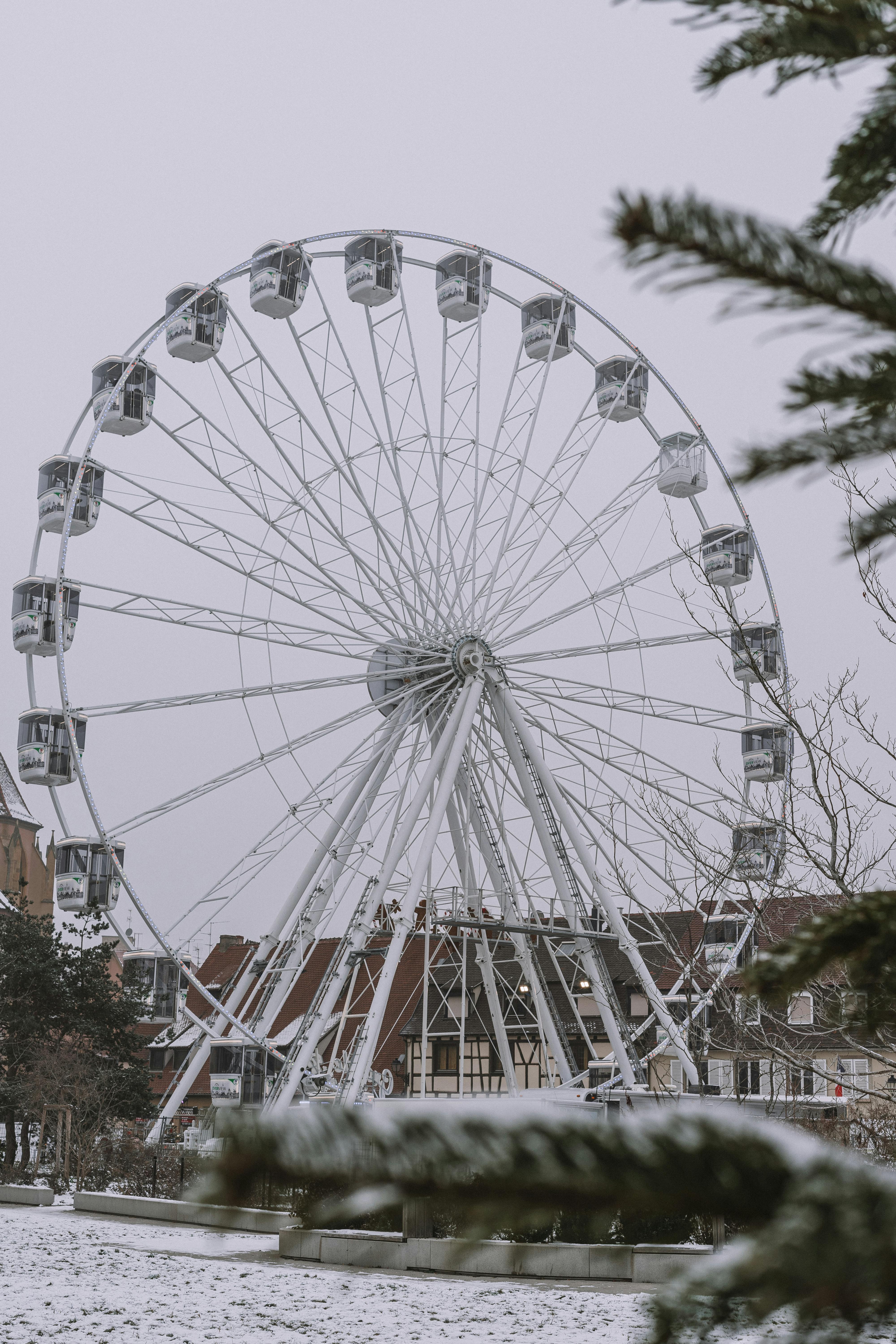 A Ferris Wheel on a Snow Covered Ground · Free Stock Photo