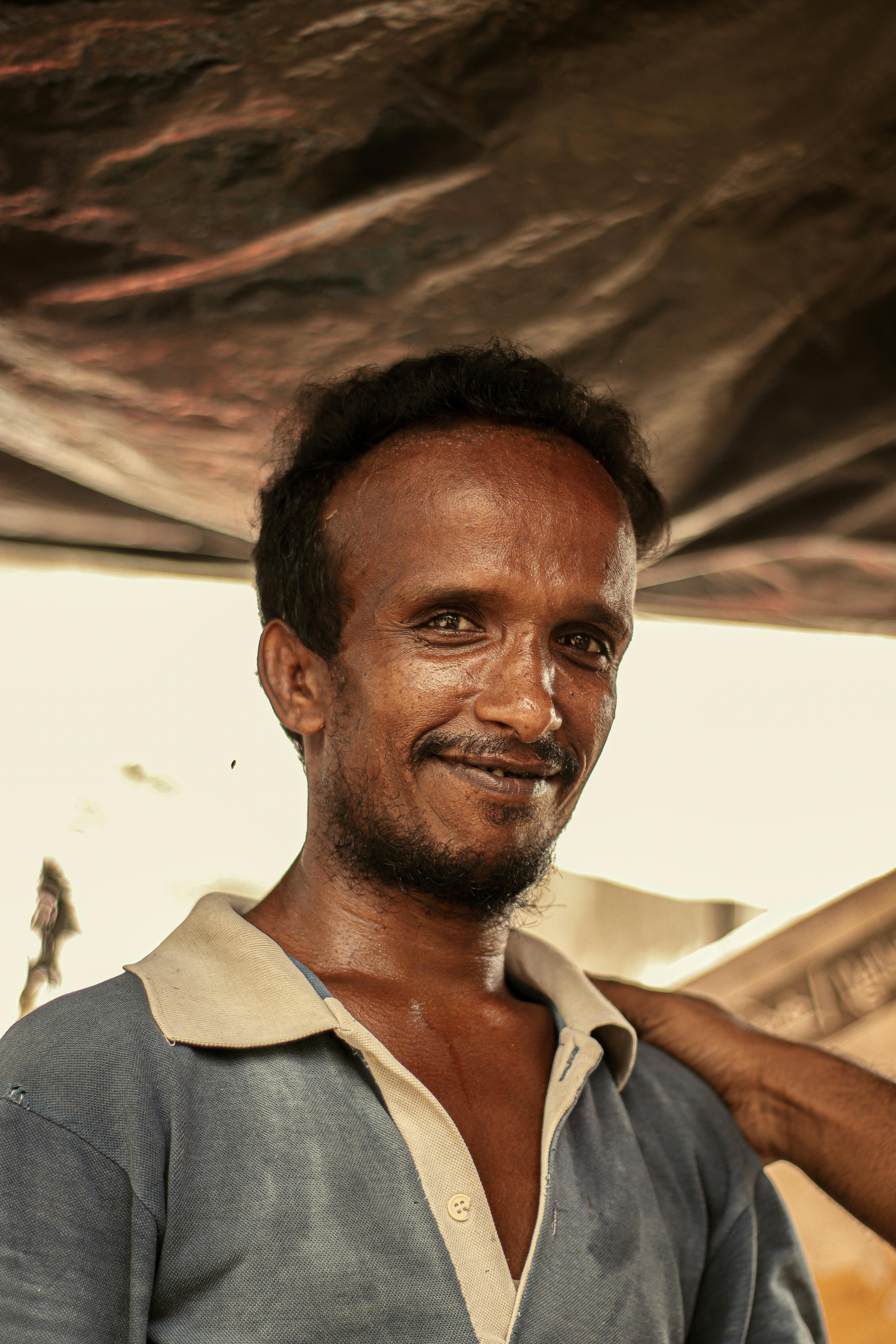Portrait of an Adult Man Smiling · Free Stock Photo