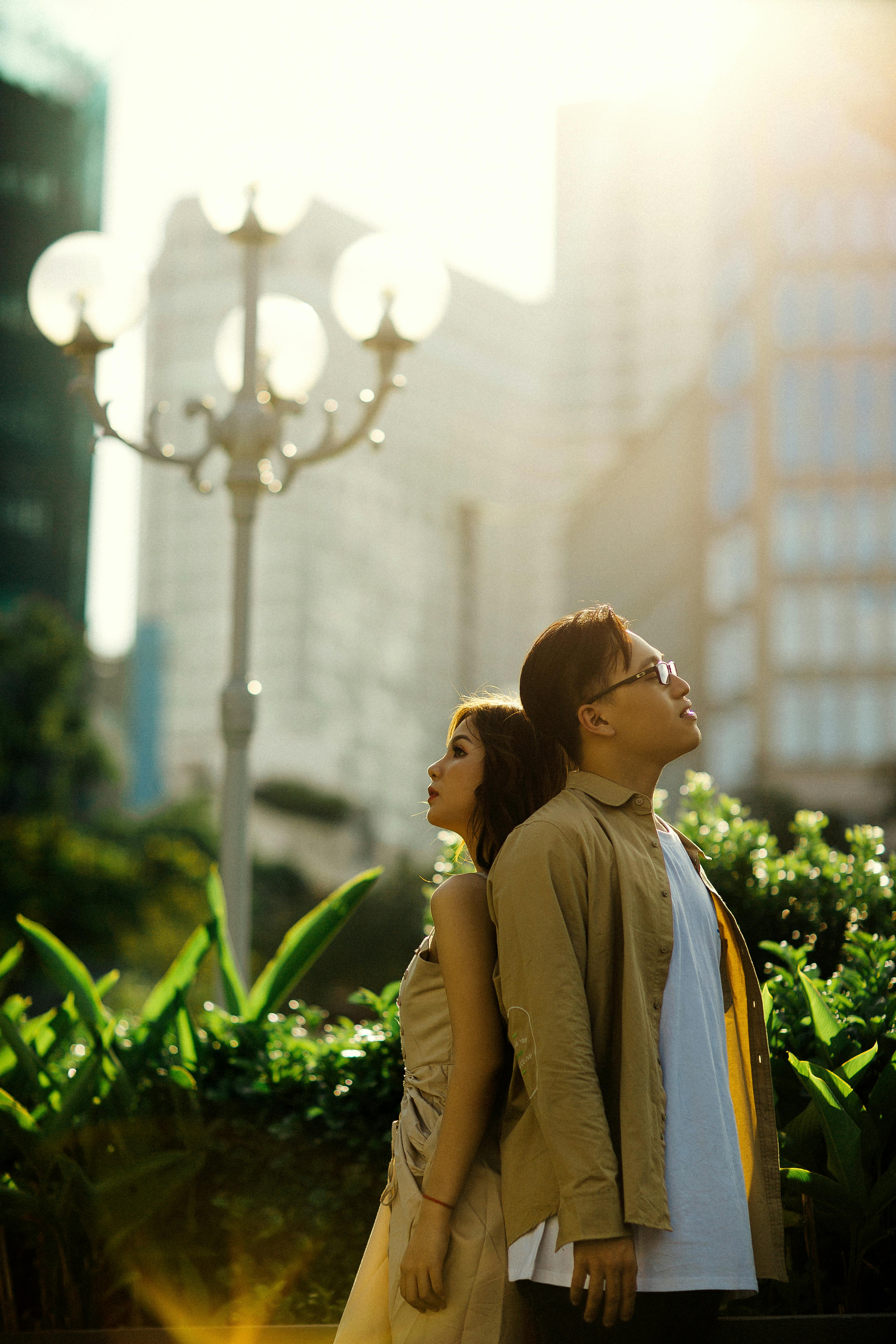 Photo of a Couple Back to Back · Free Stock Photo