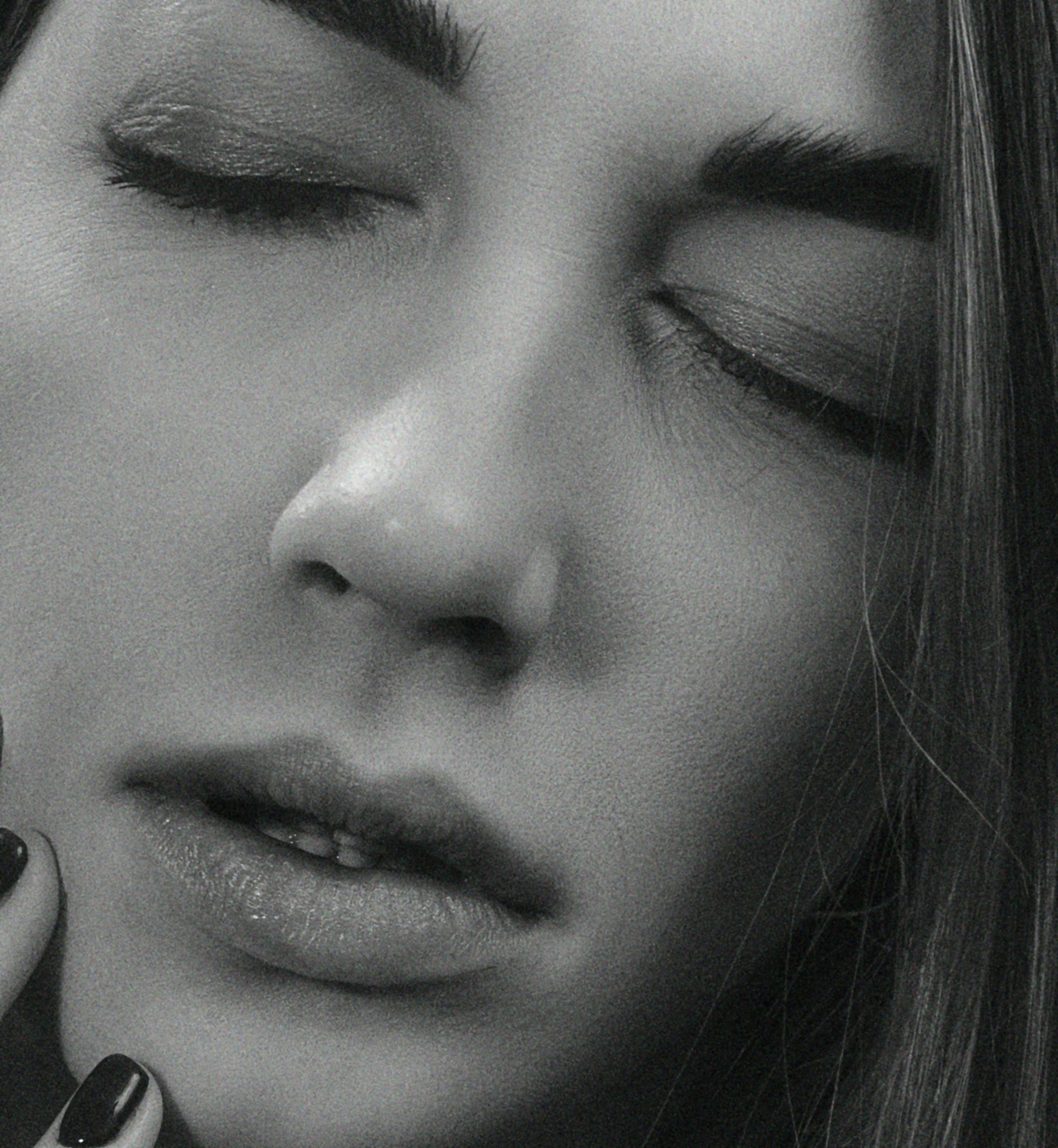 Close Up Shot of a Woman While Eyes Closed · Free Stock Photo