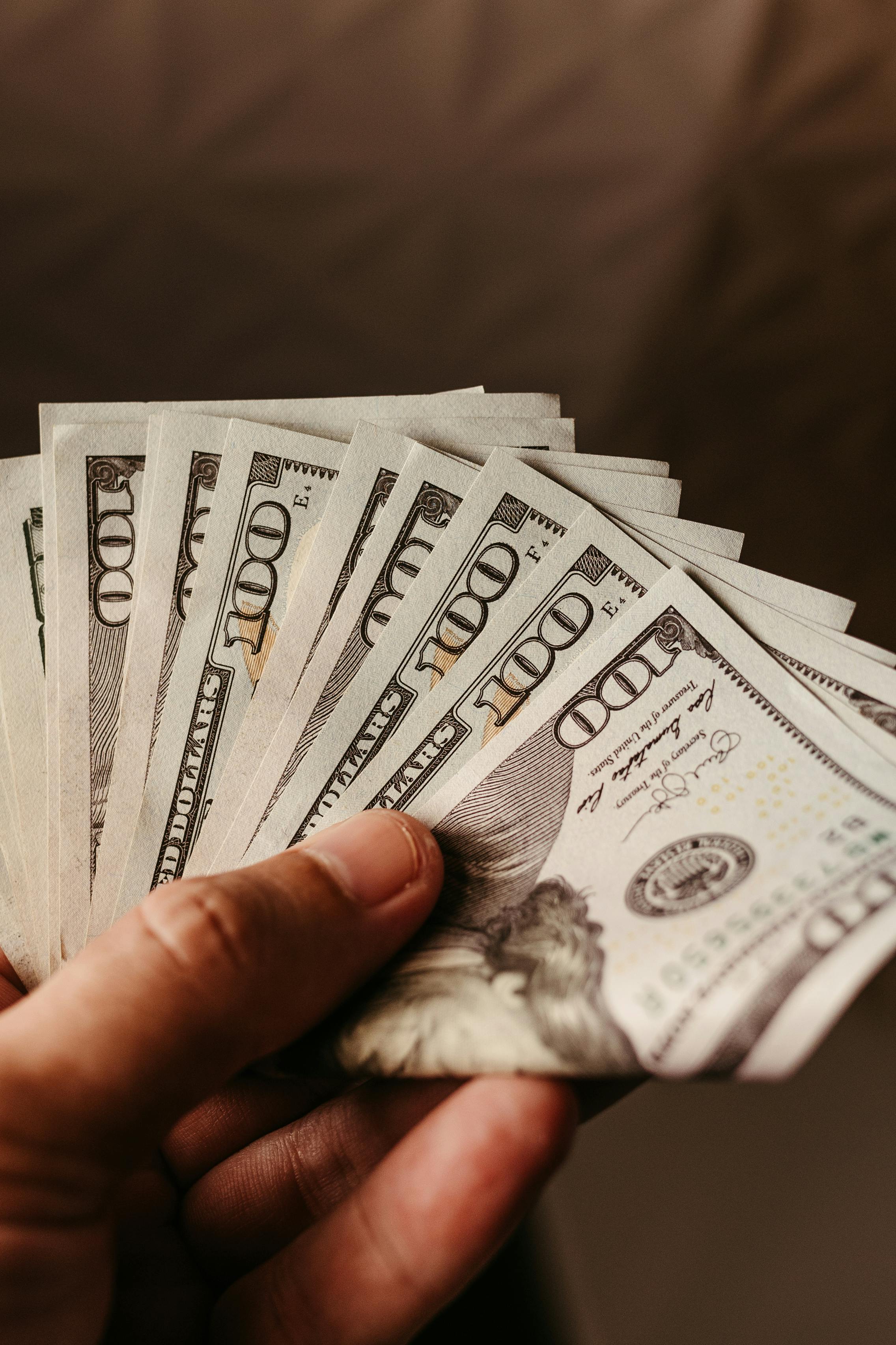 Brown Leather Wallet and Us Dollar Banknote · Free Stock Photo