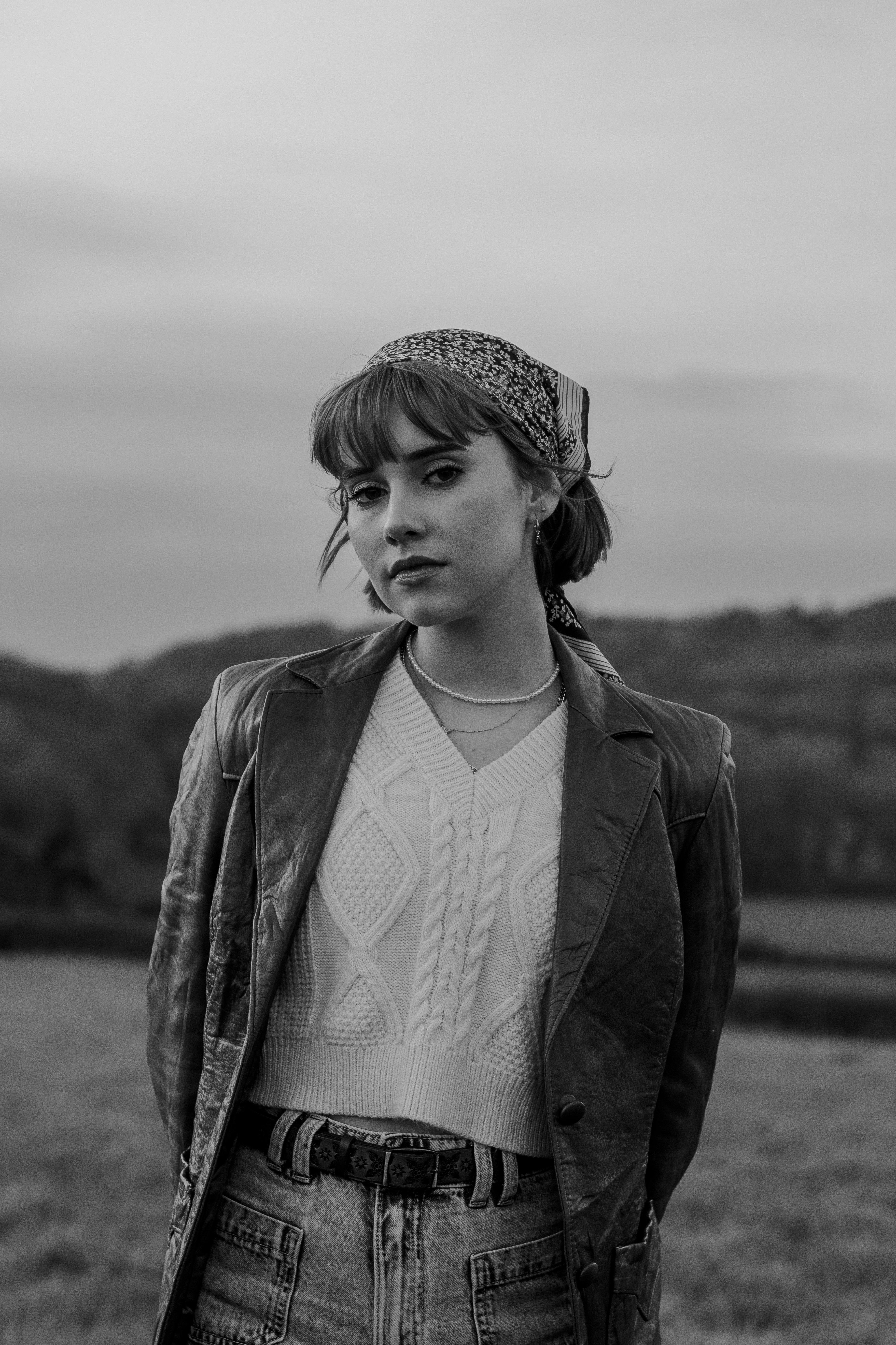 Woman in Leather Jacket Wearing Bandana · Free Stock Photo