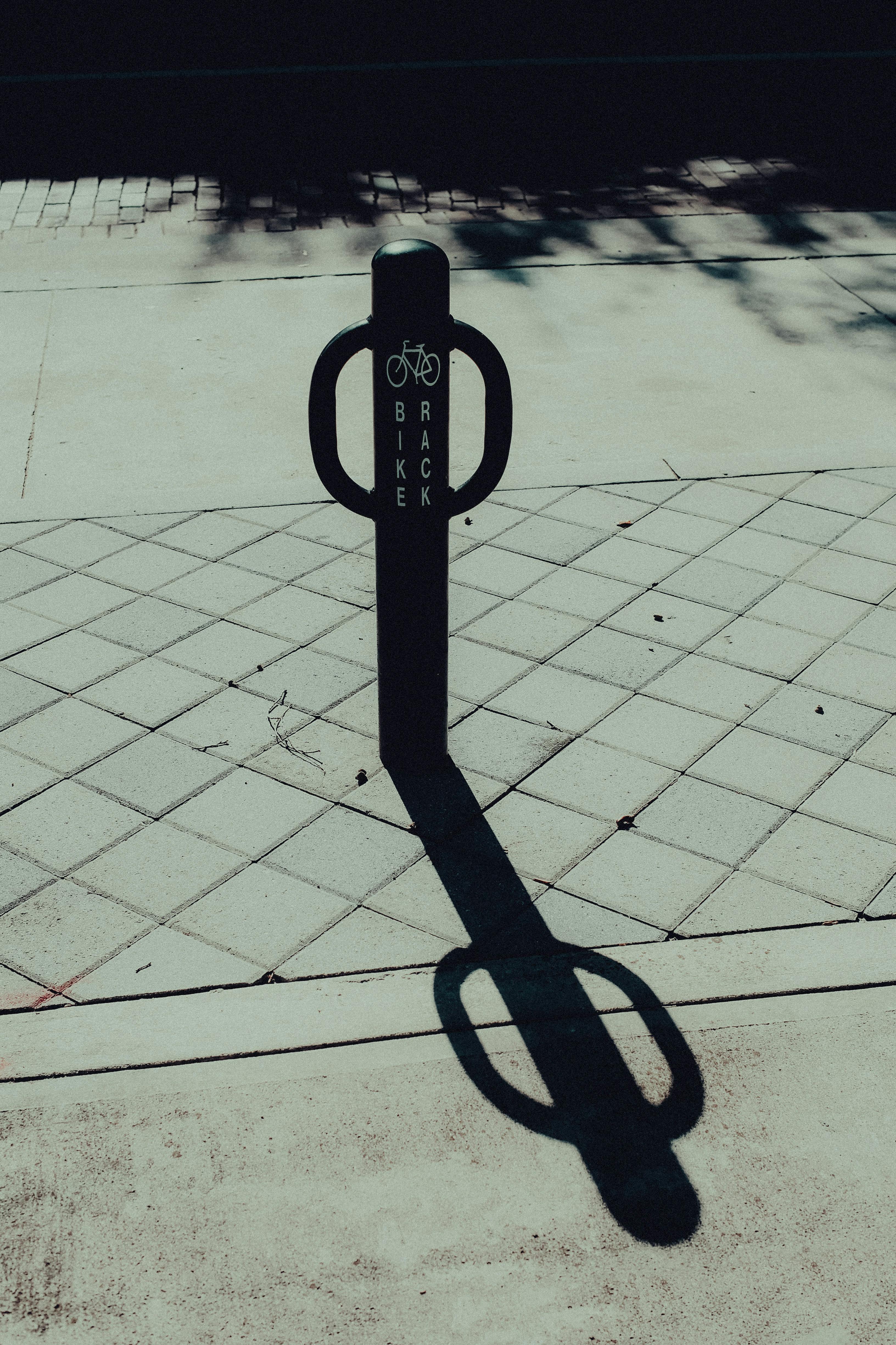 A Bicycle Rack on a Sidewalk · Free Stock Photo