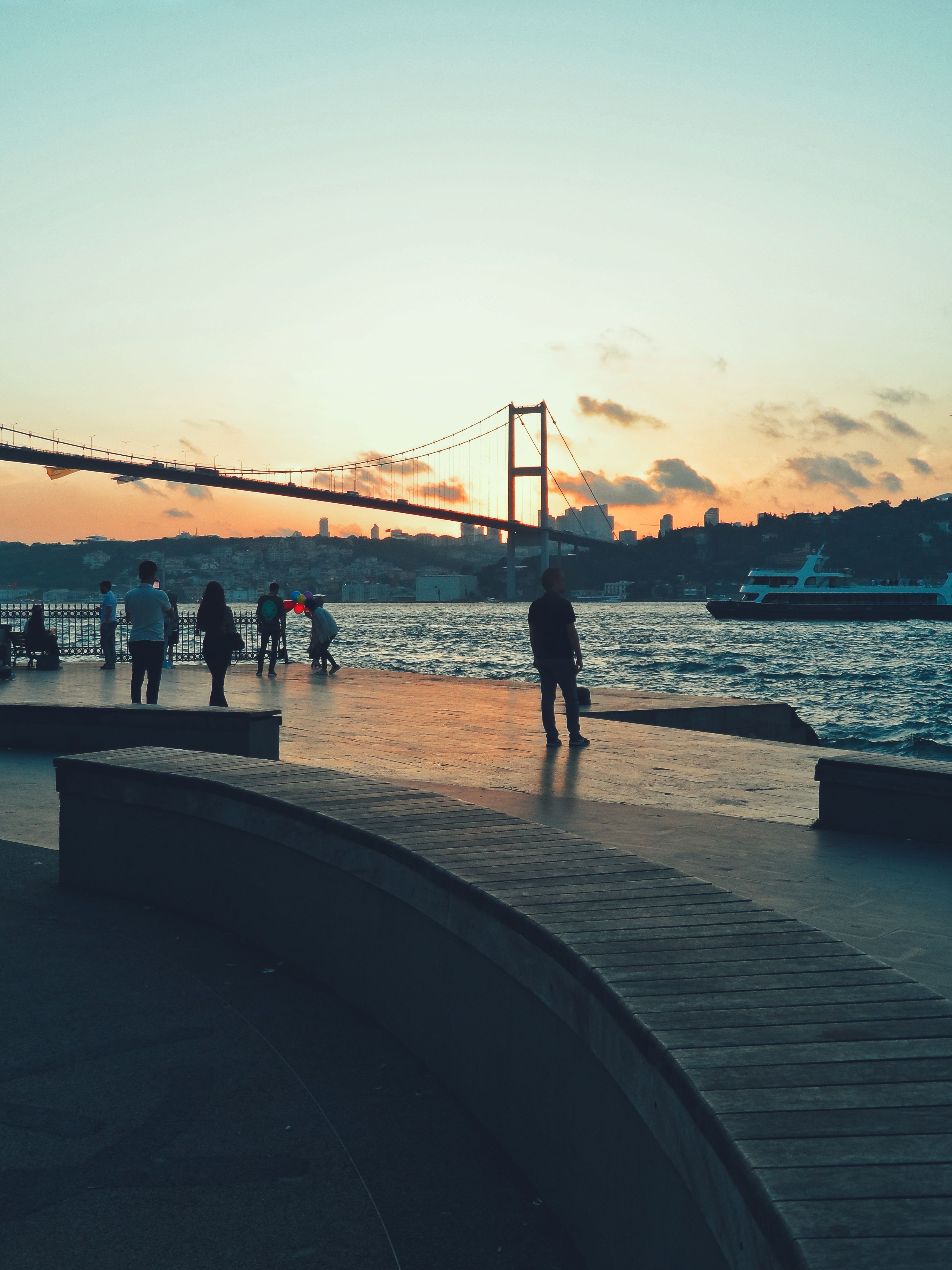 Person Crossing a Bridge · Free Stock Photo