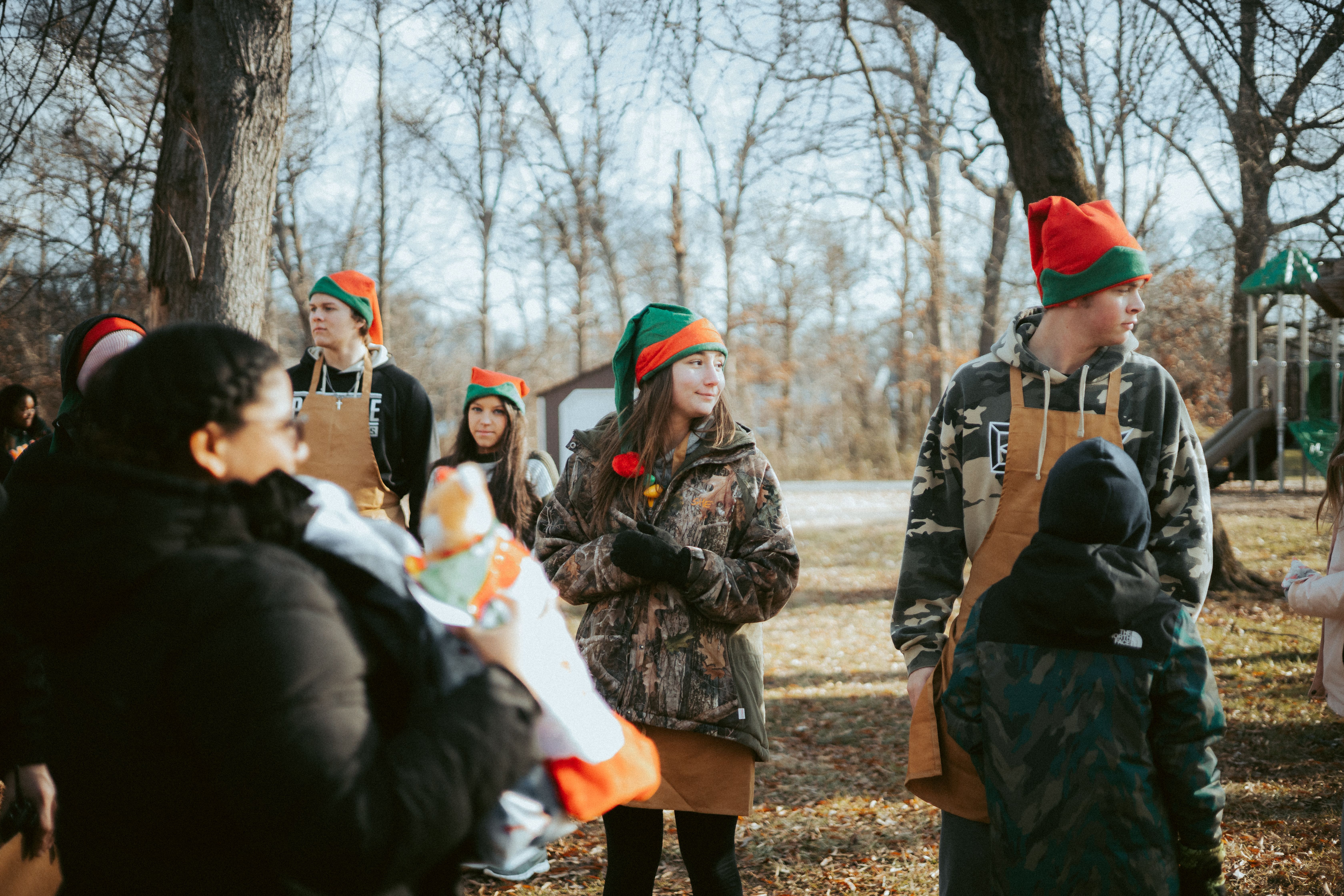 Young Workers in Elf Hats · Free Stock Photo