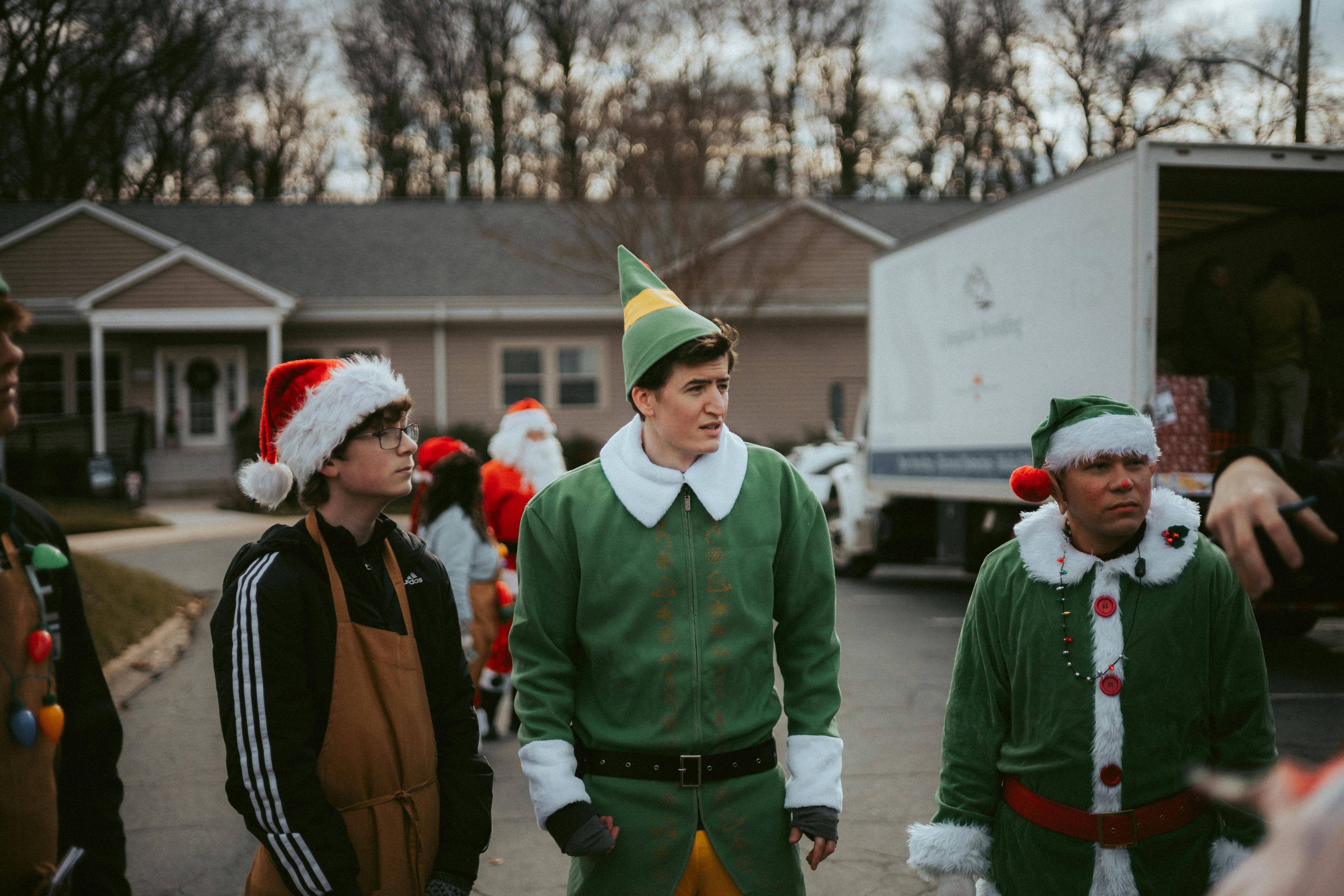 People in Christmas Costumes on a Christmas Event in City · Free Stock ...
