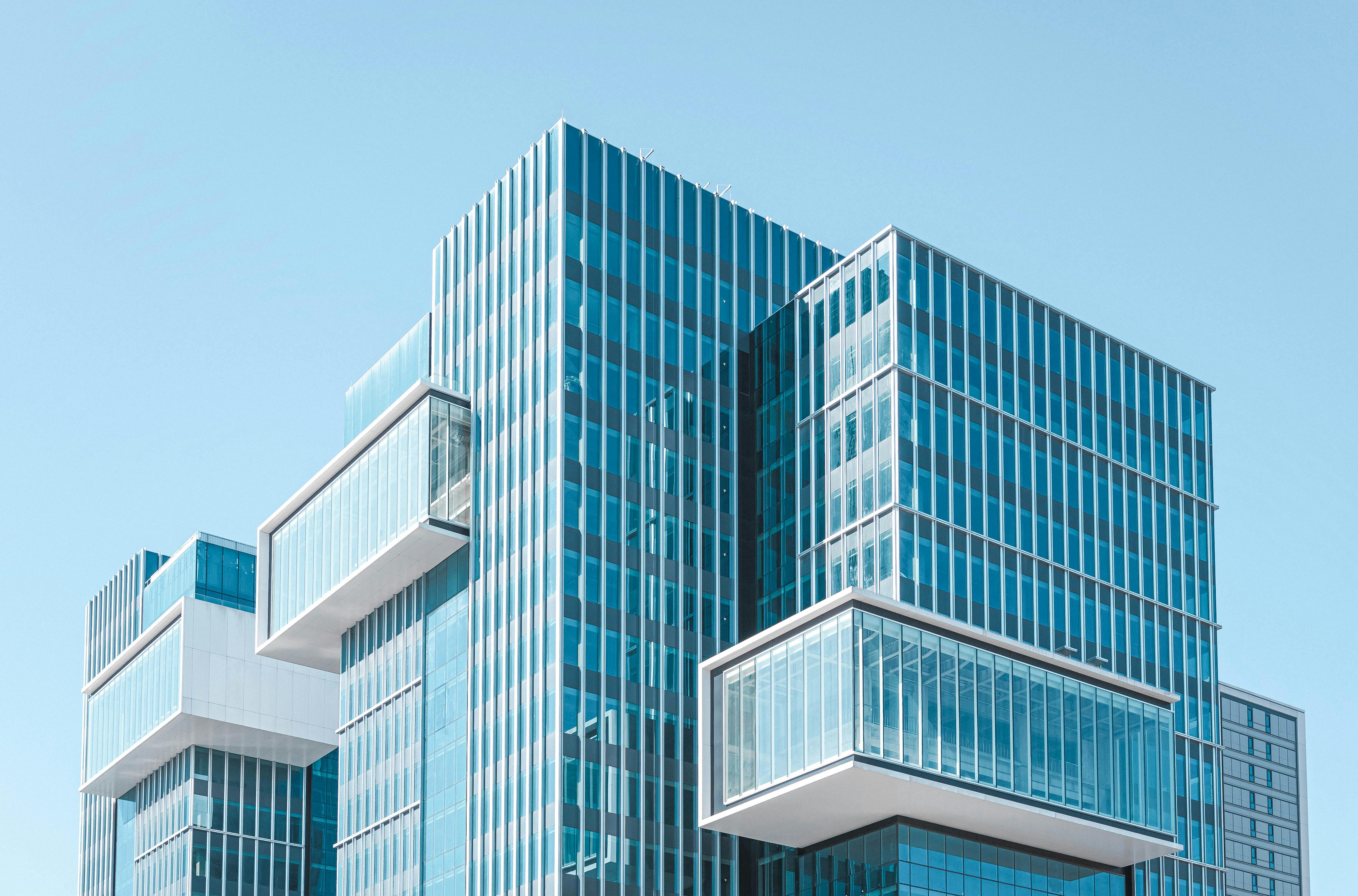 High-rise Building Near Trees · Free Stock Photo