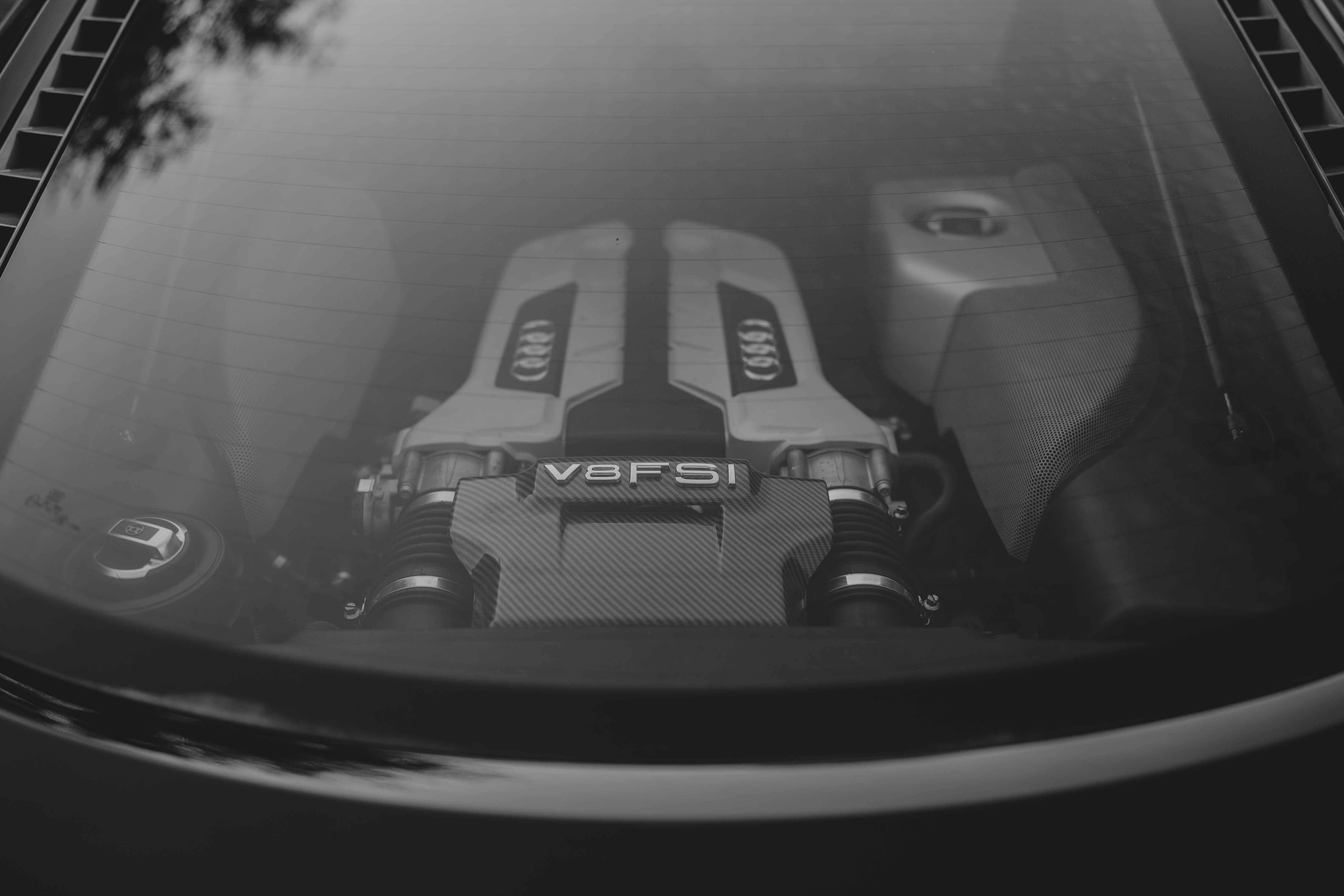 V8 Engine behind Car Window · Free Stock Photo