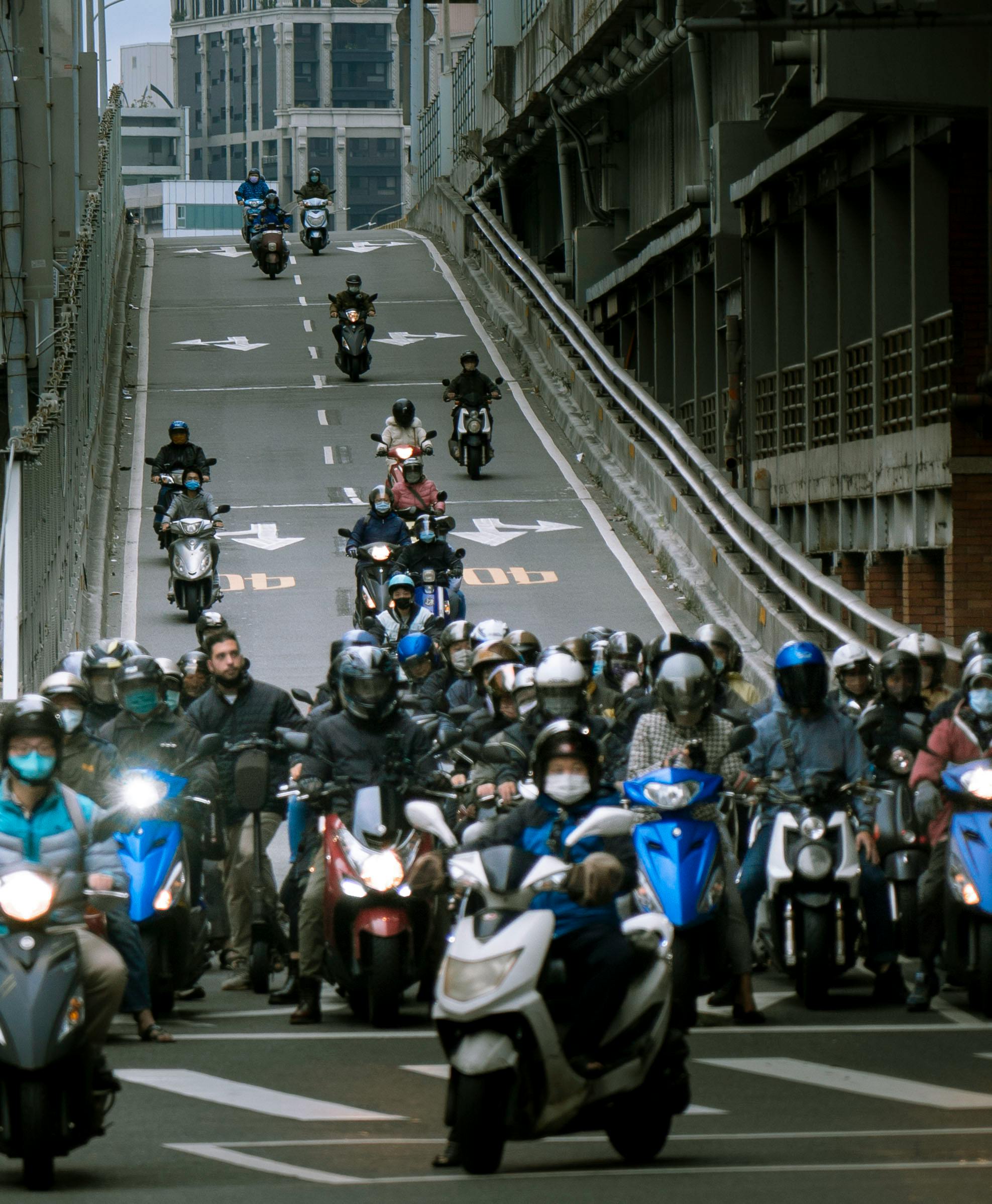 A People Riding Motorcycle on a Road · Free Stock Photo