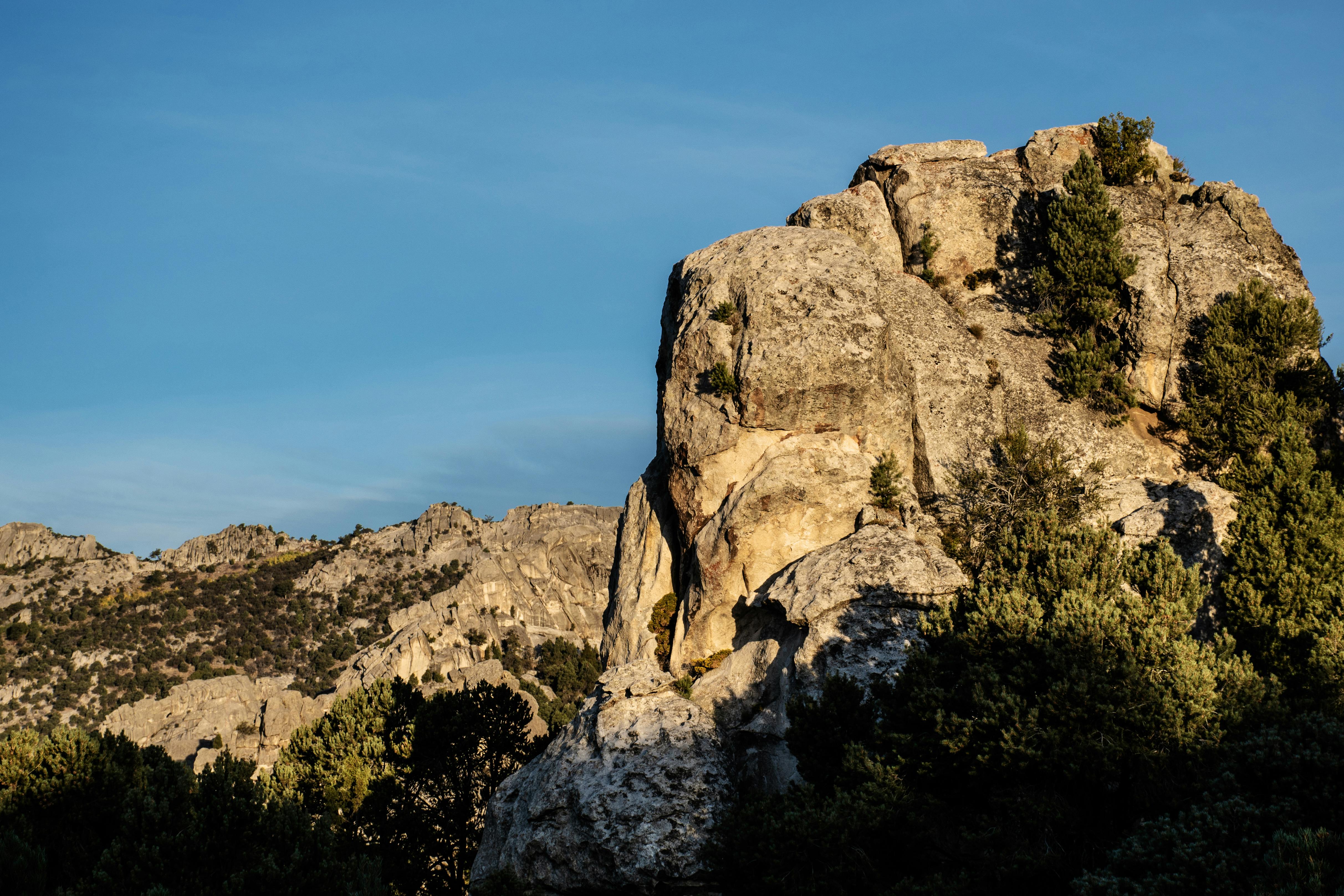 Photography of Brown Rock Near Mountain · Free Stock Photo