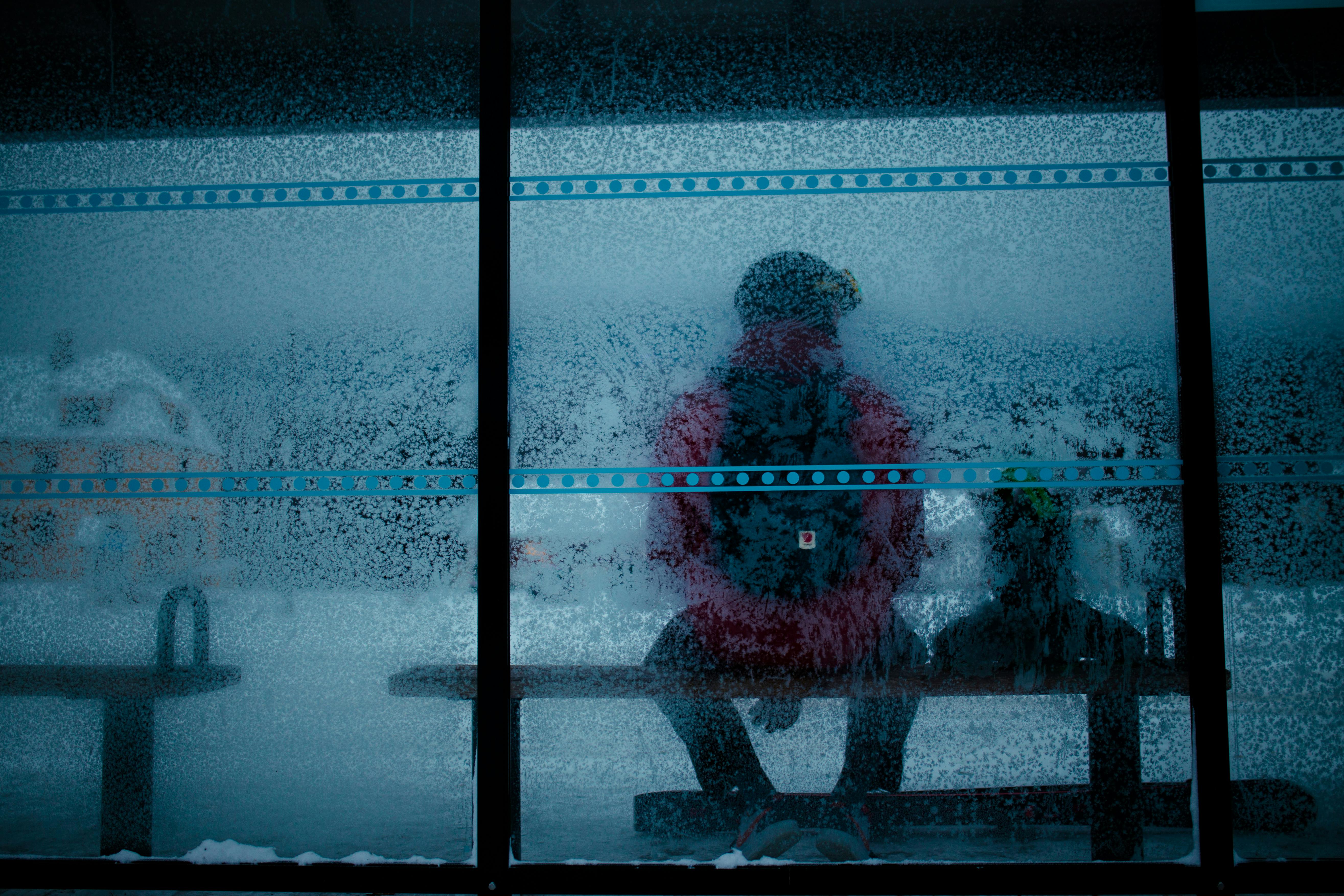 Person Leaning On A Glass Window · Free Stock Photo