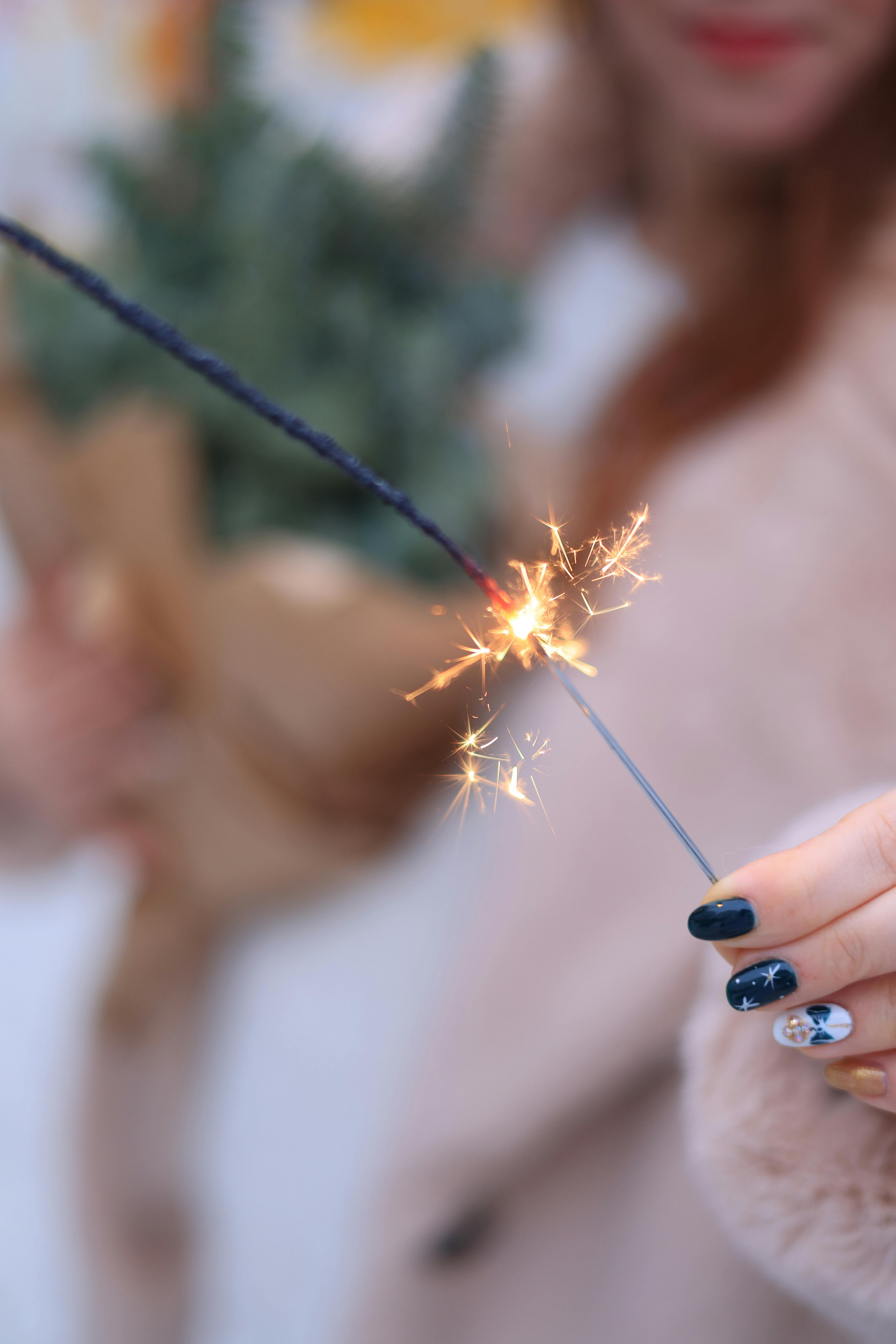 Close-Up Shot of Burning Sparkler · Free Stock Photo