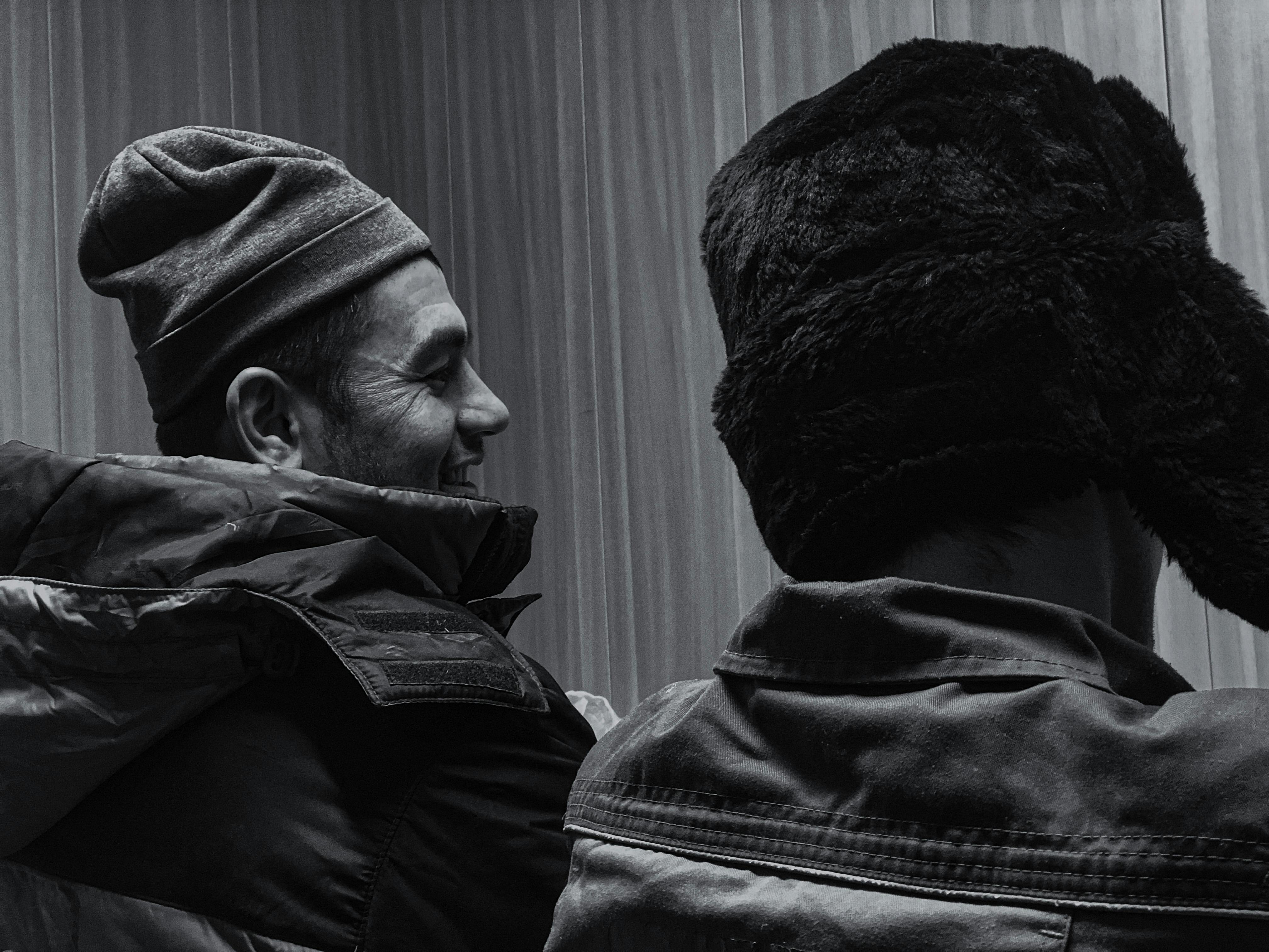 Grayscale Photo of Men · Free Stock Photo