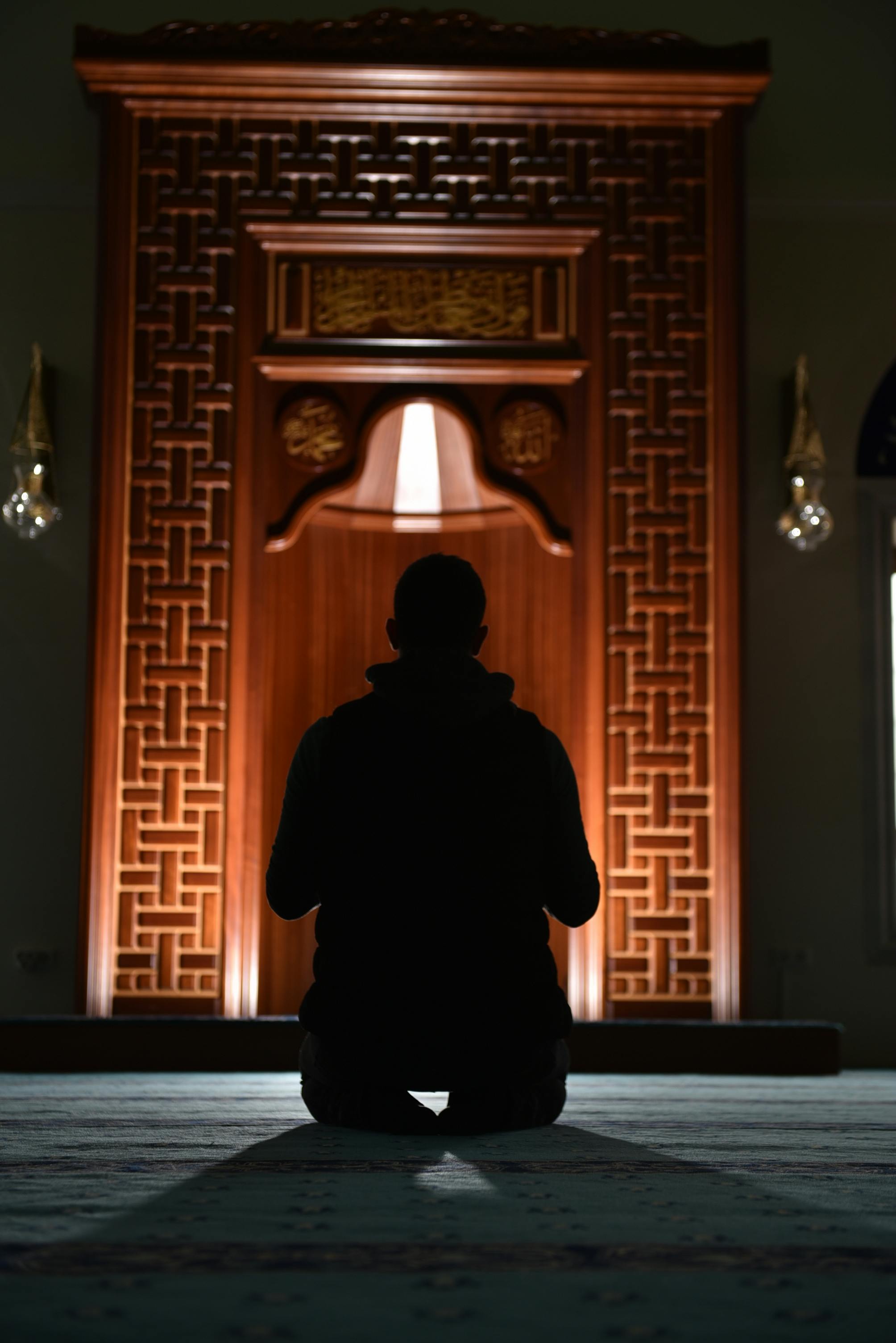 Man Praying in Mosque · Free Stock Photo