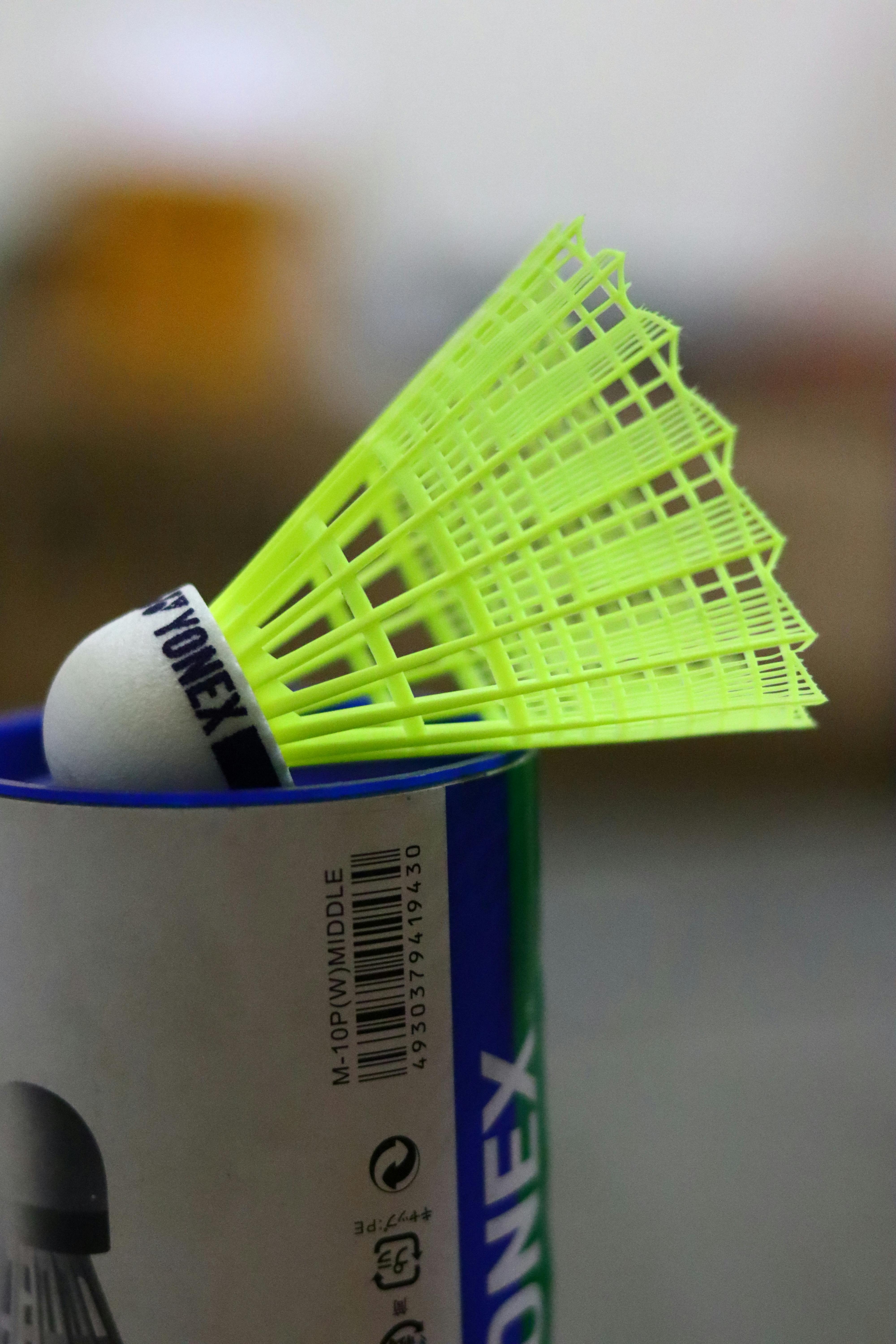 A Close-Up Shot of a Shuttlecock on a Badminton Court Floor · Free ...