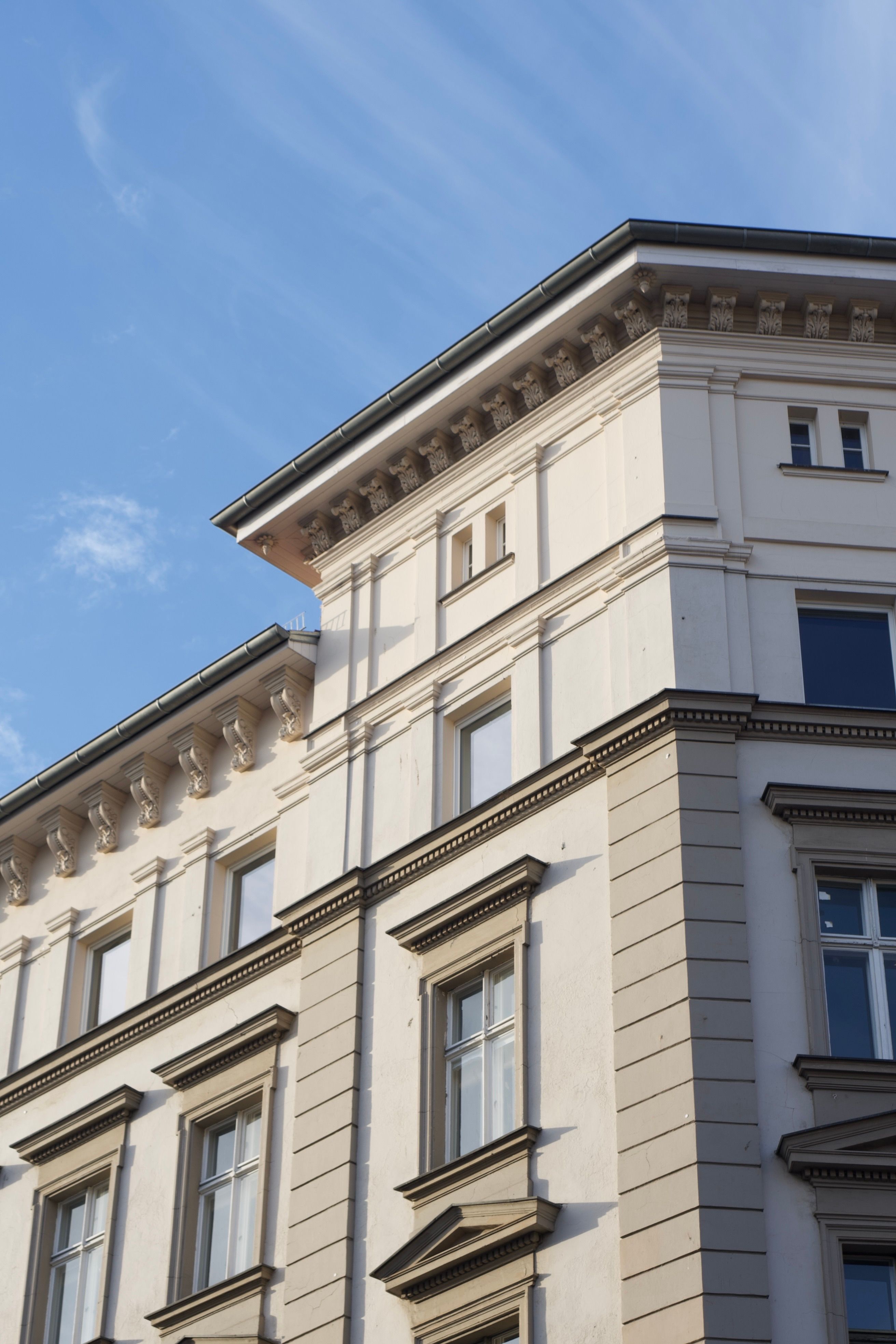Historic European Building with Sharp Spire · Free Stock Photo