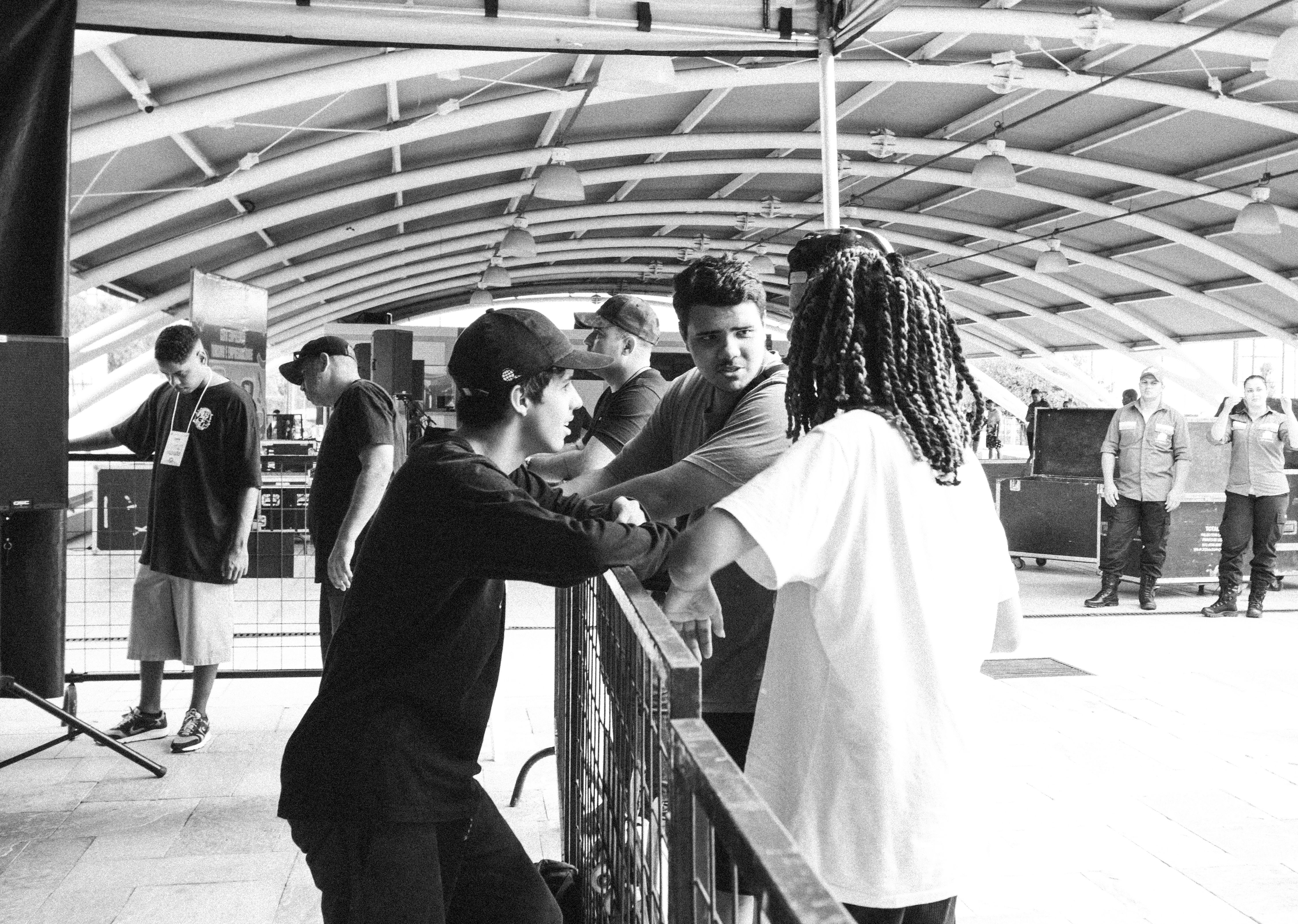 Grayscale Photo of People Having a Conversation · Free Stock Photo