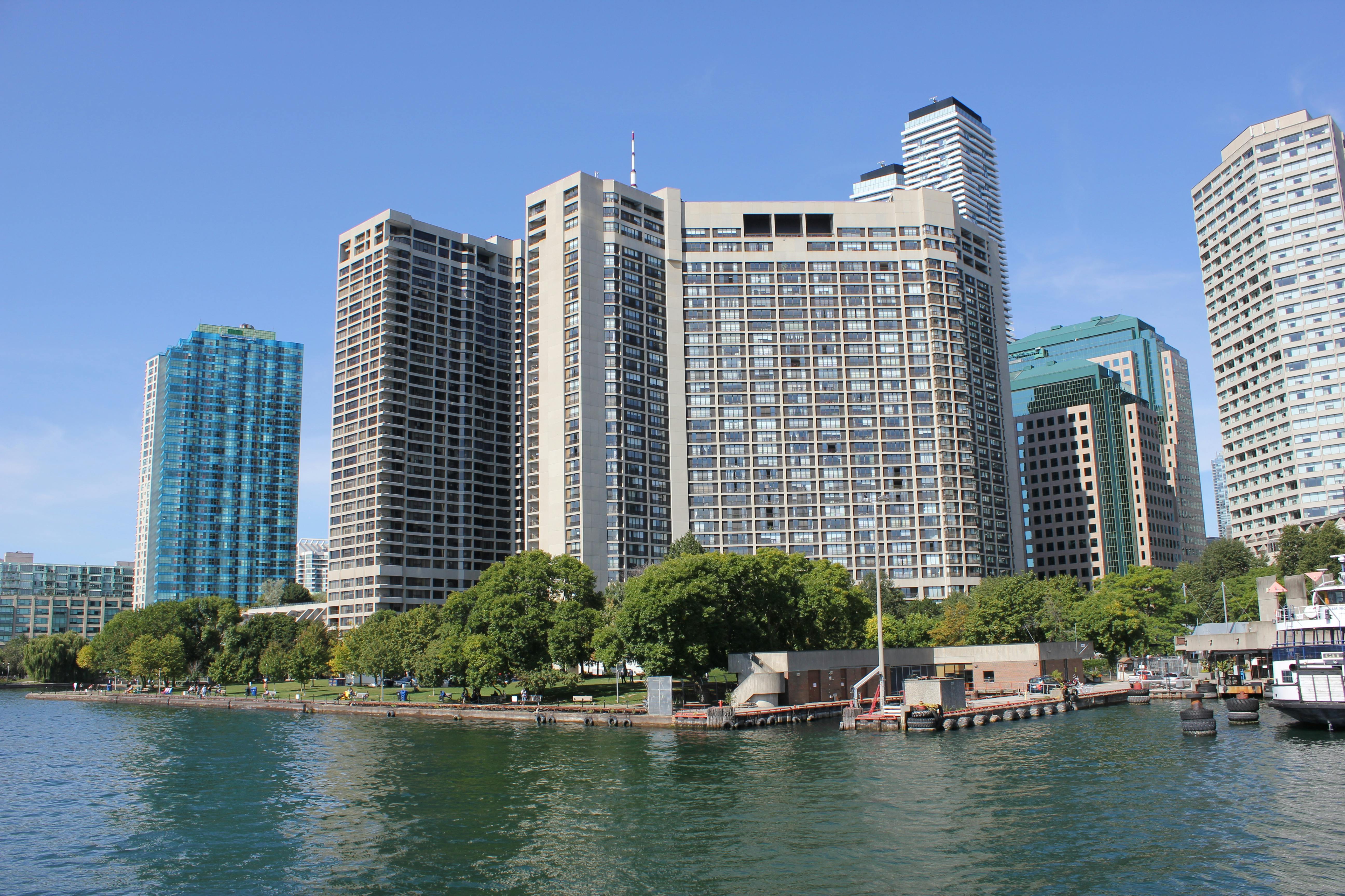 Modern Buildings near River · Free Stock Photo
