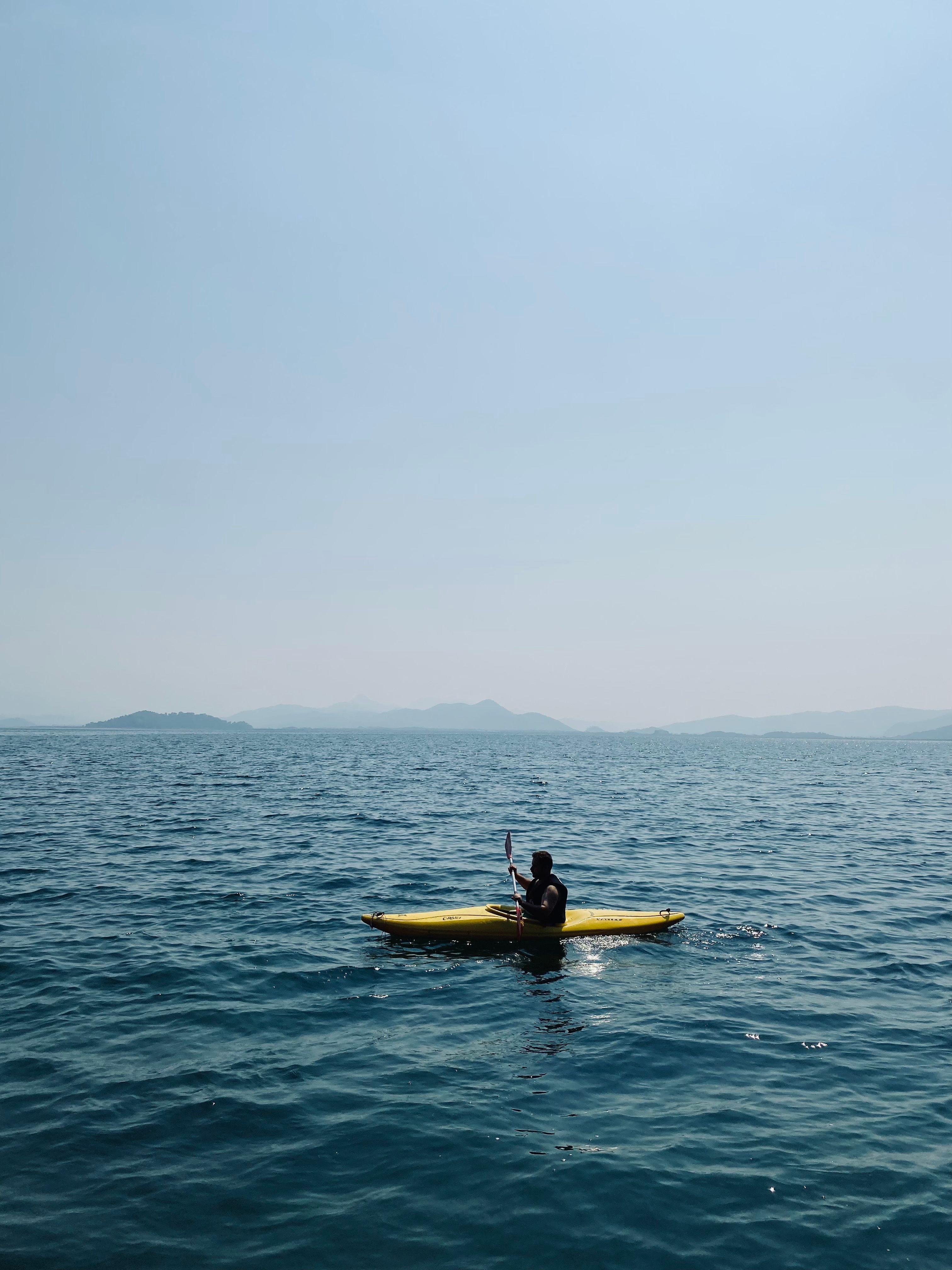 A Person Kayaking in the Ocean · Free Stock Photo