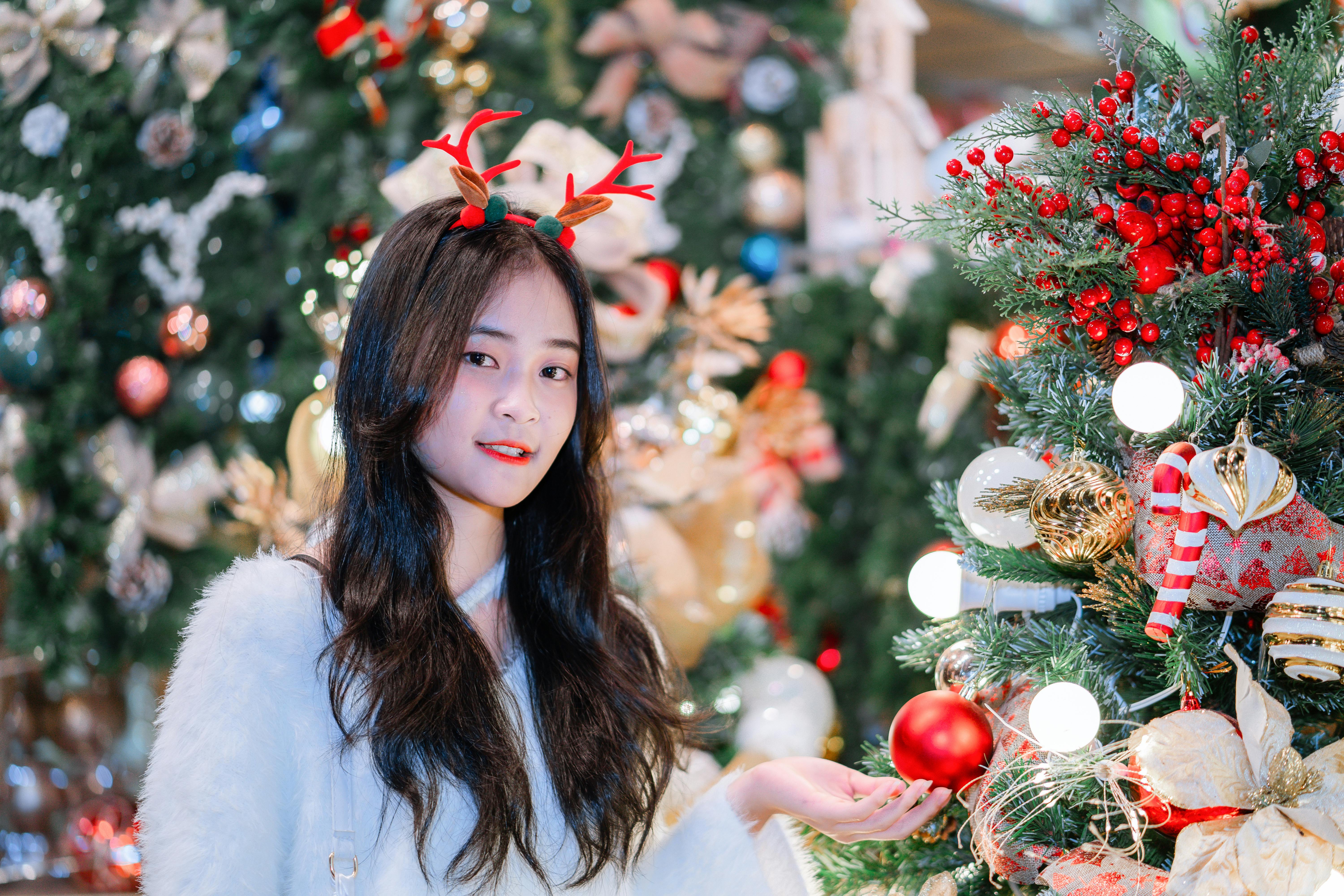 A Woman Wearing Antler Deer Headband · Free Stock Photo