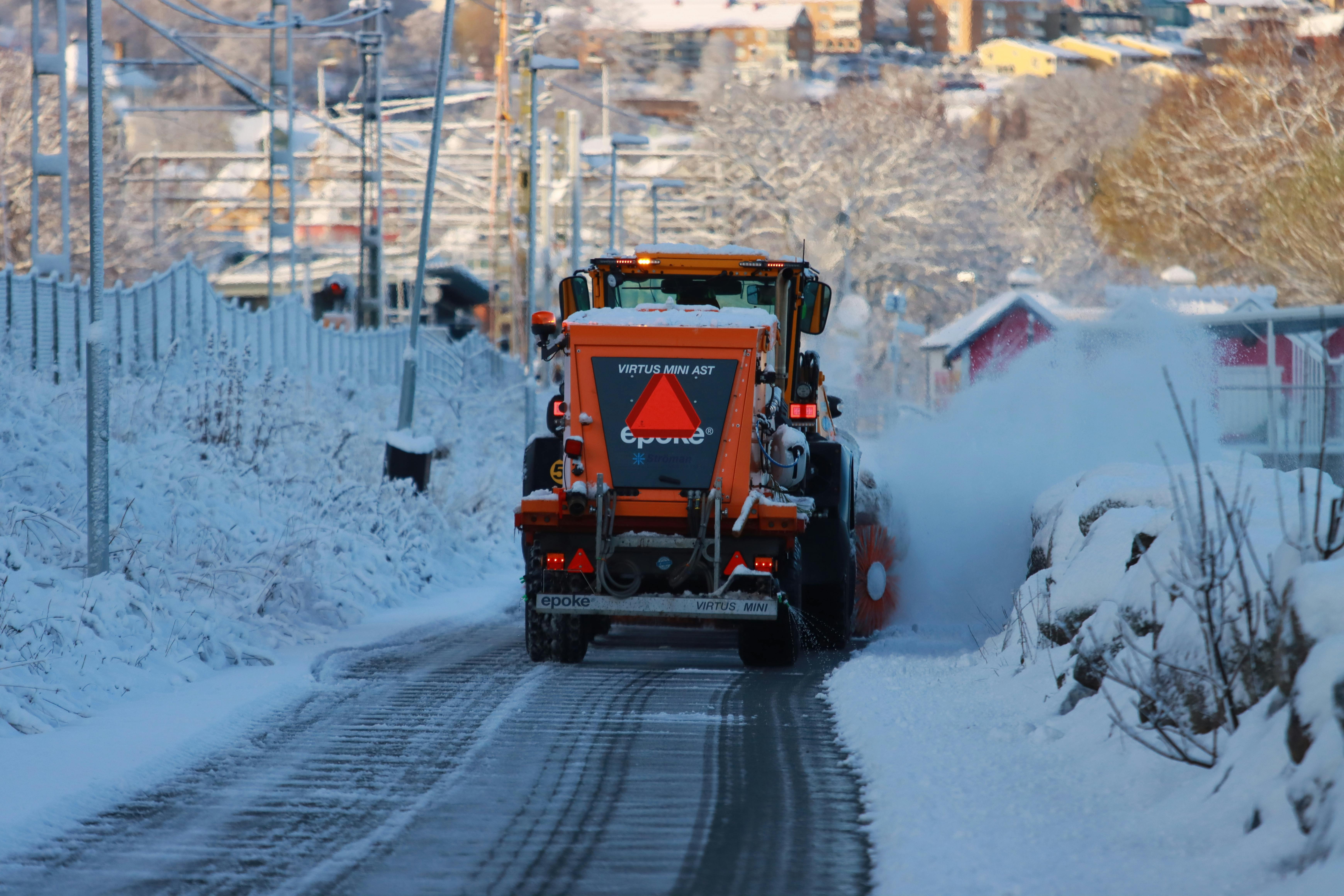 Snow Clearing Machine on Winter City Street · Free Stock Photo