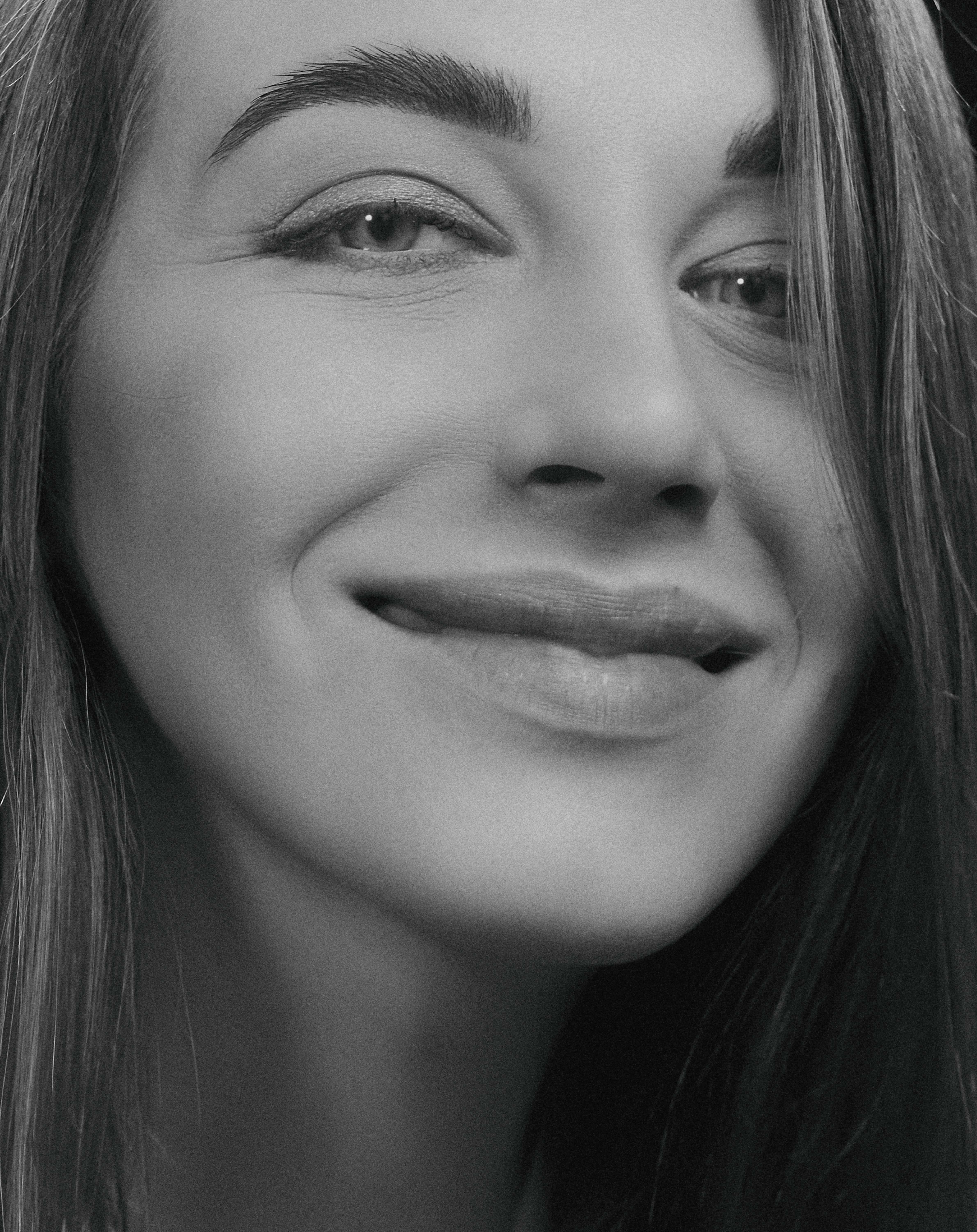 Headshot of a Woman Smiling at the Camera · Free Stock Photo