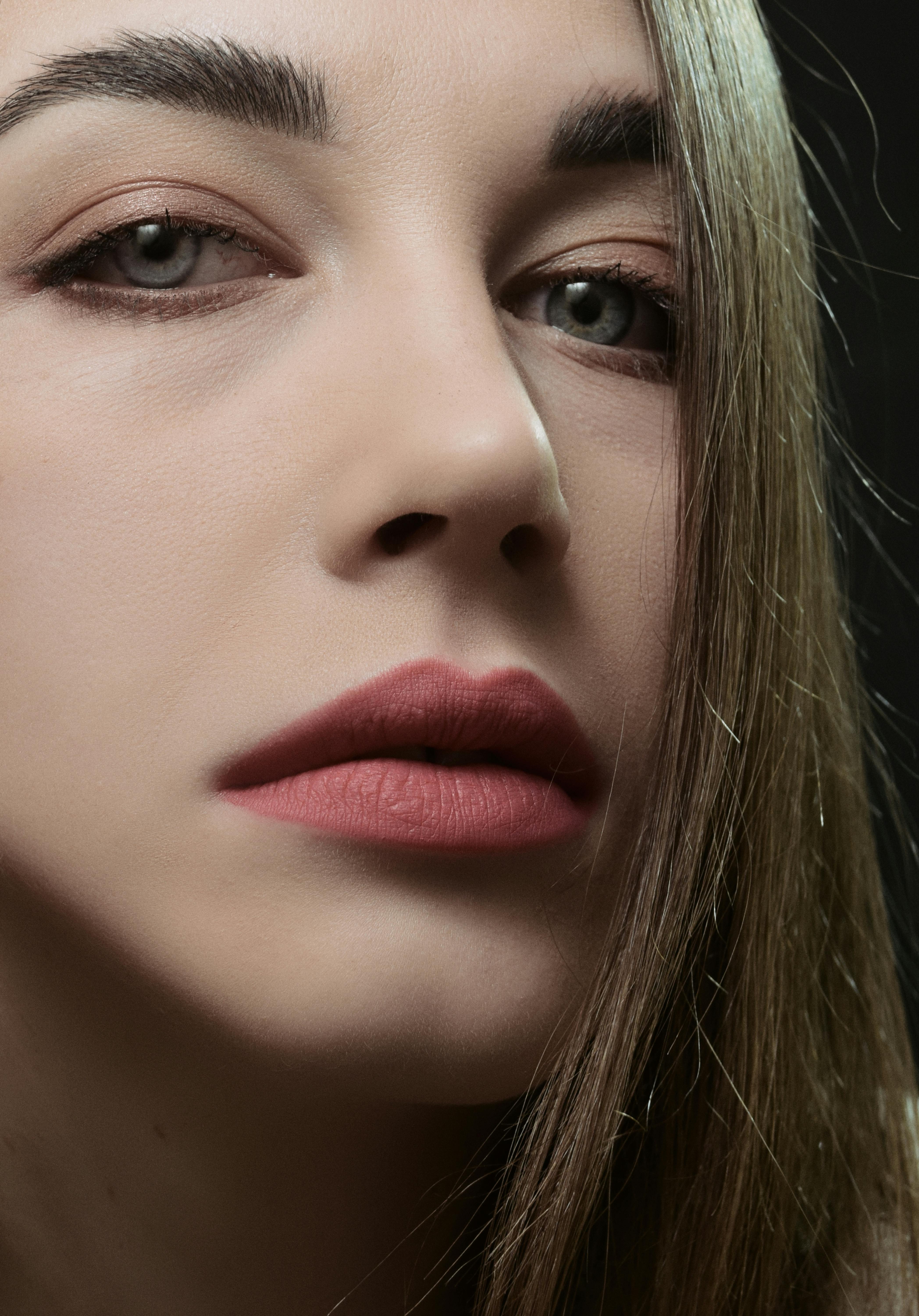 Close-Up Shot of a Woman's Face · Free Stock Photo