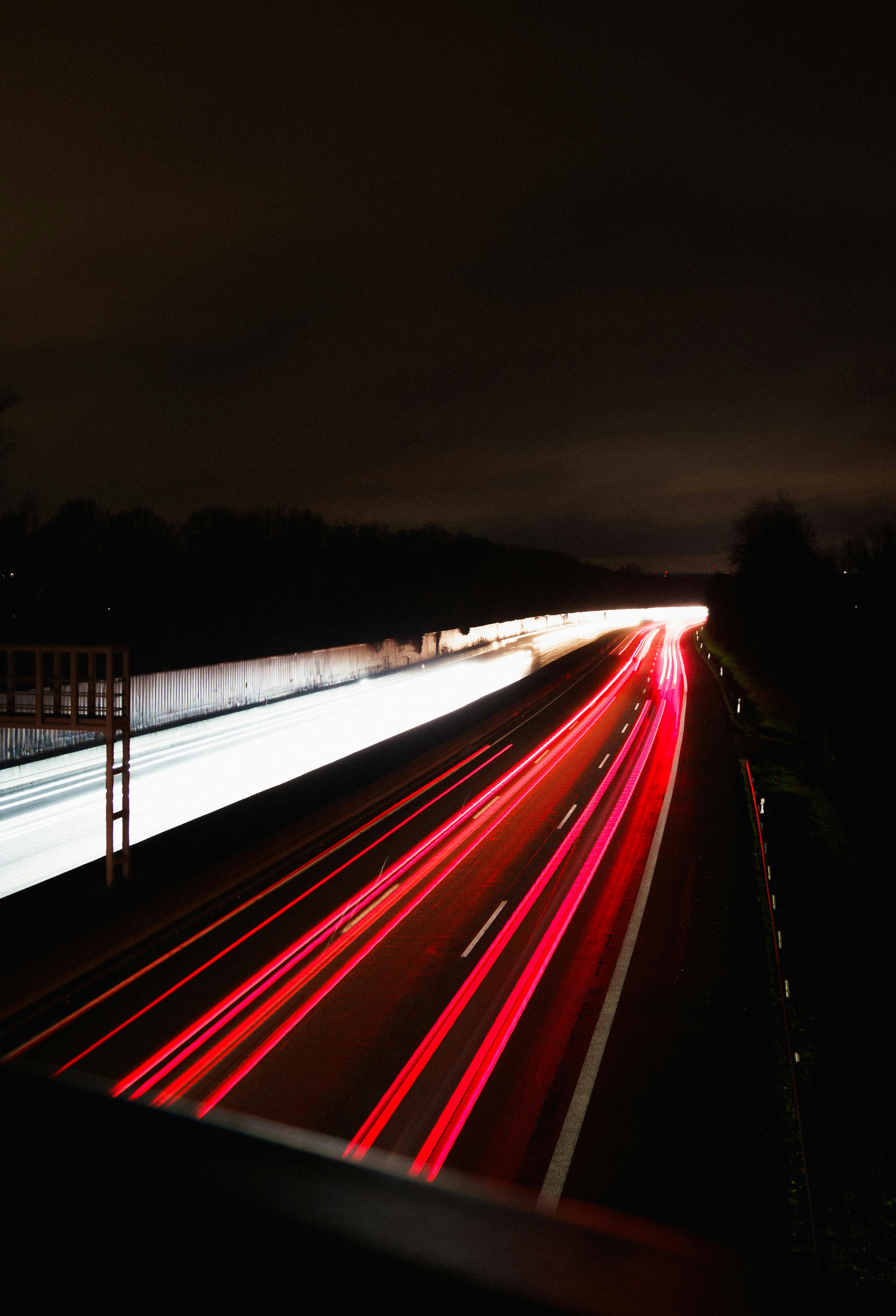 Red Lights over Road at Night · Free Stock Photo