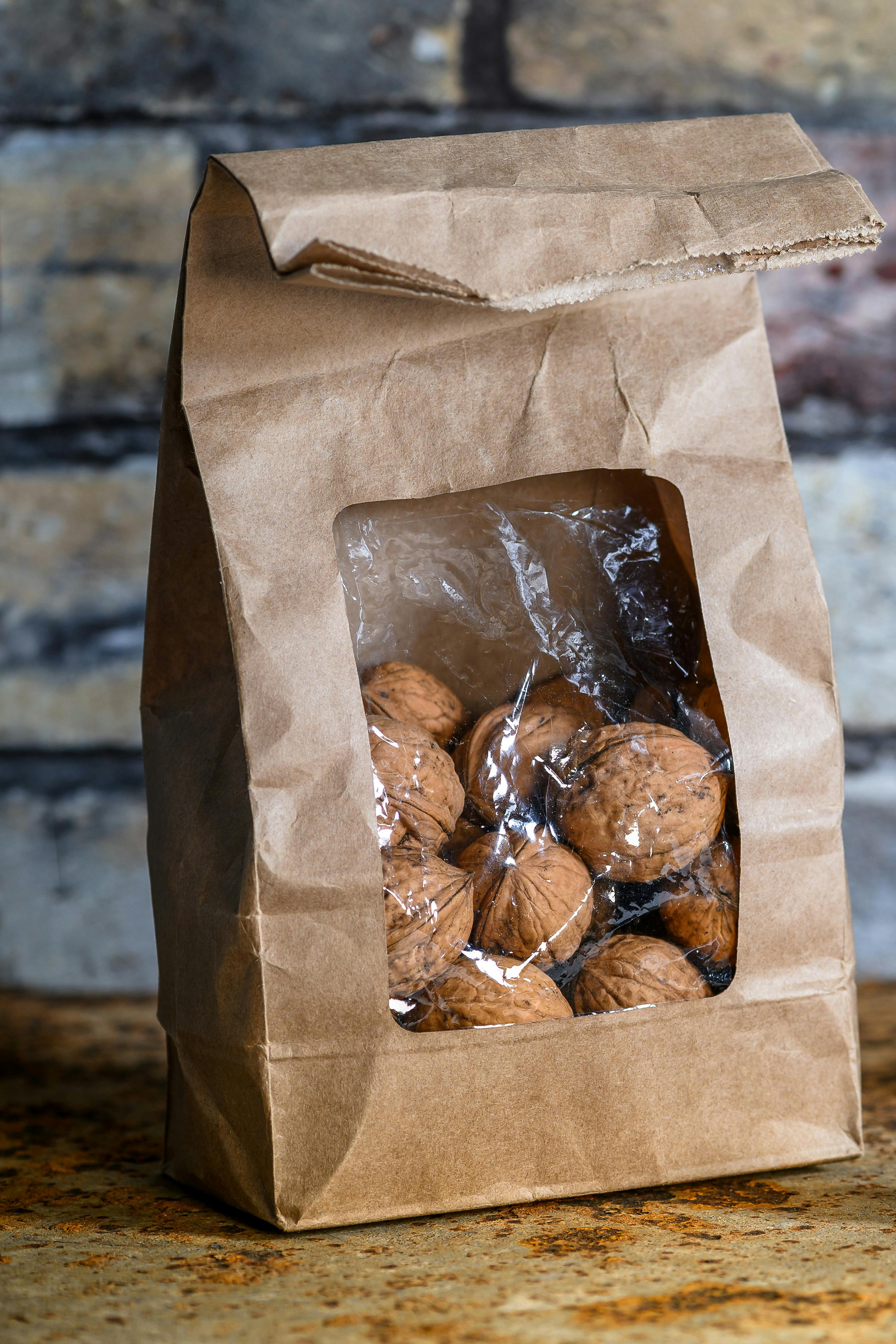 Close-up of Person Using a Pastry Bag to Squeeze Pastry onto a Tray ...