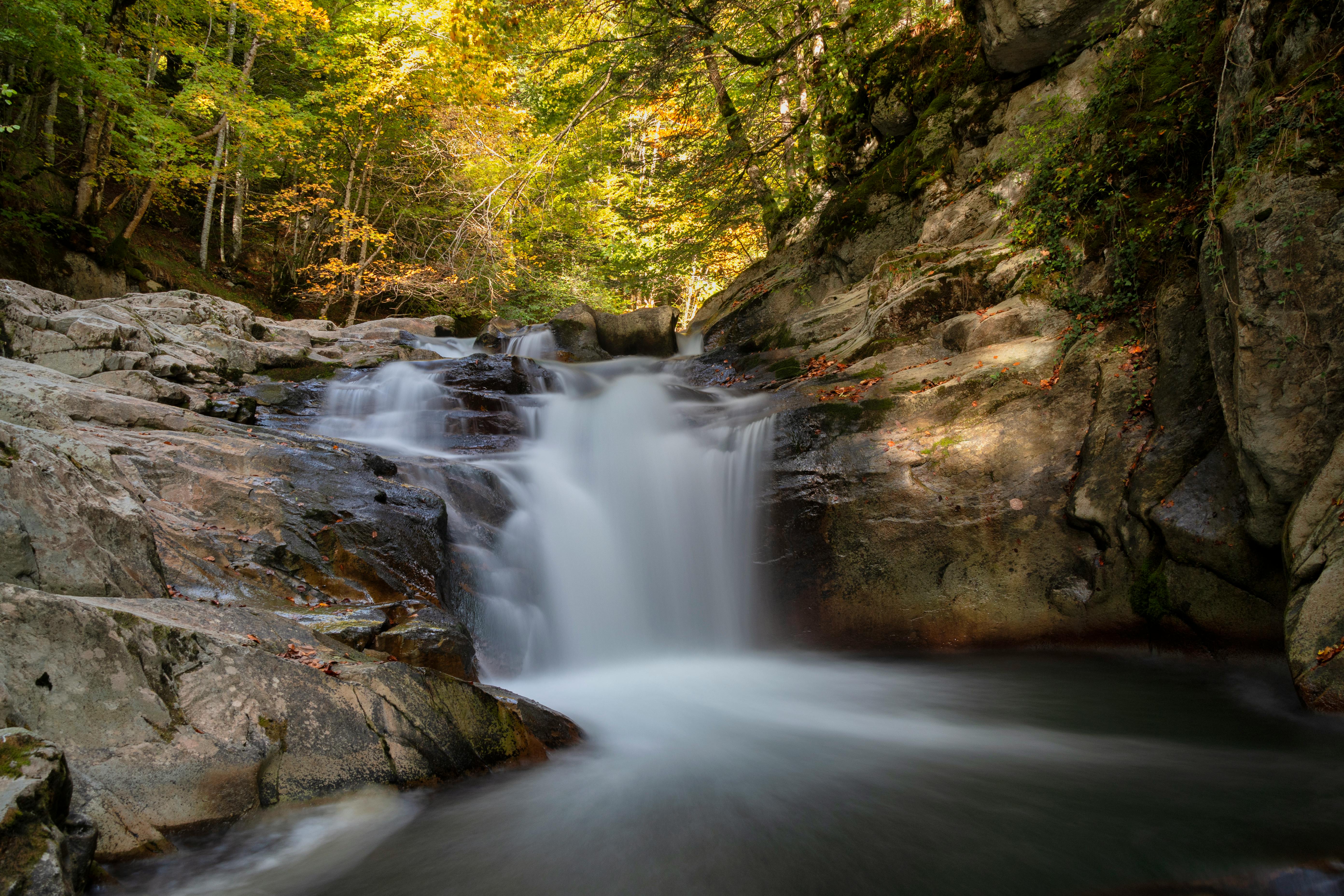 Photo of a Waterfall in a Grotto · Free Stock Photo